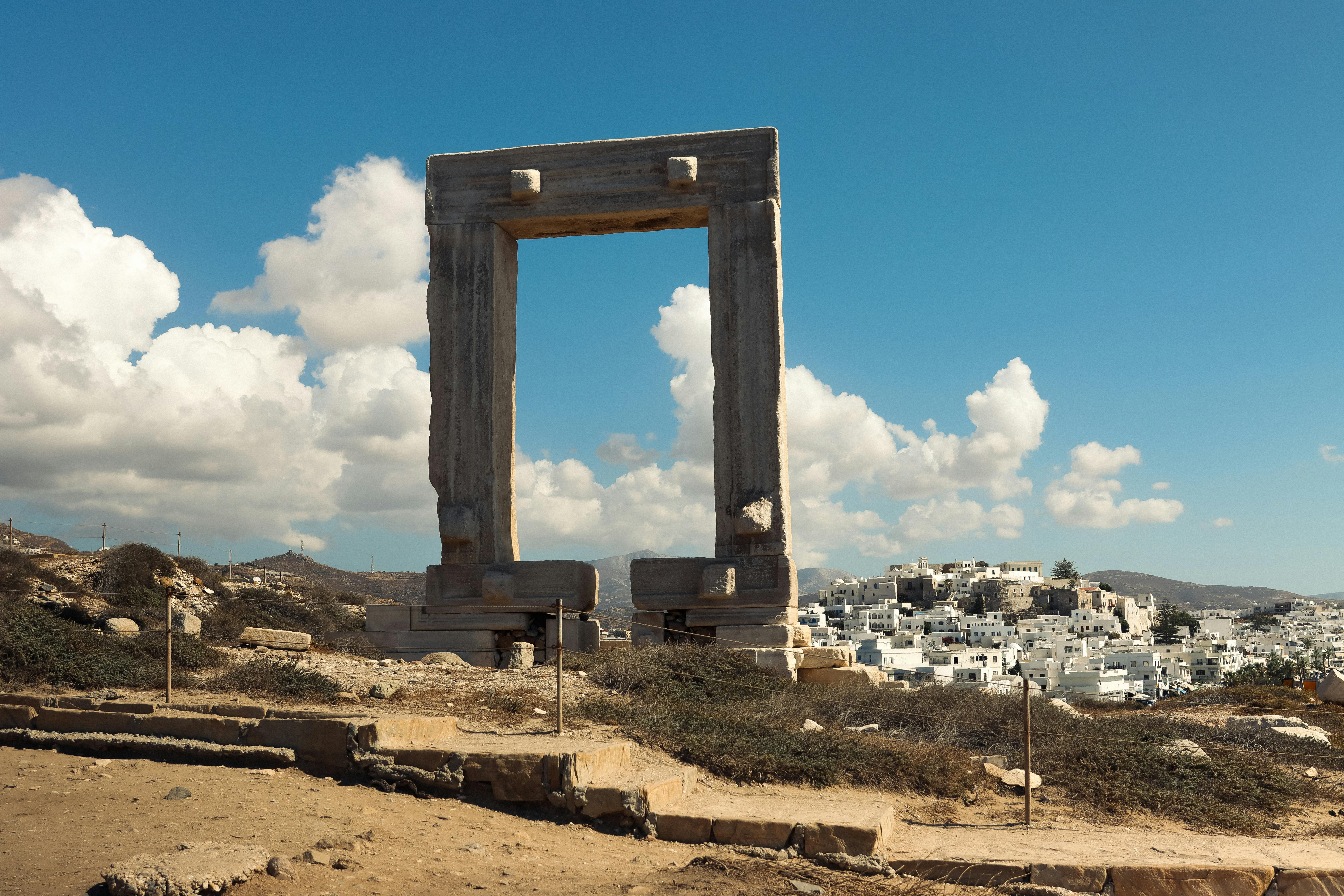 Ancient Portara Gate with Naxos Town in View · Free Stock Photo