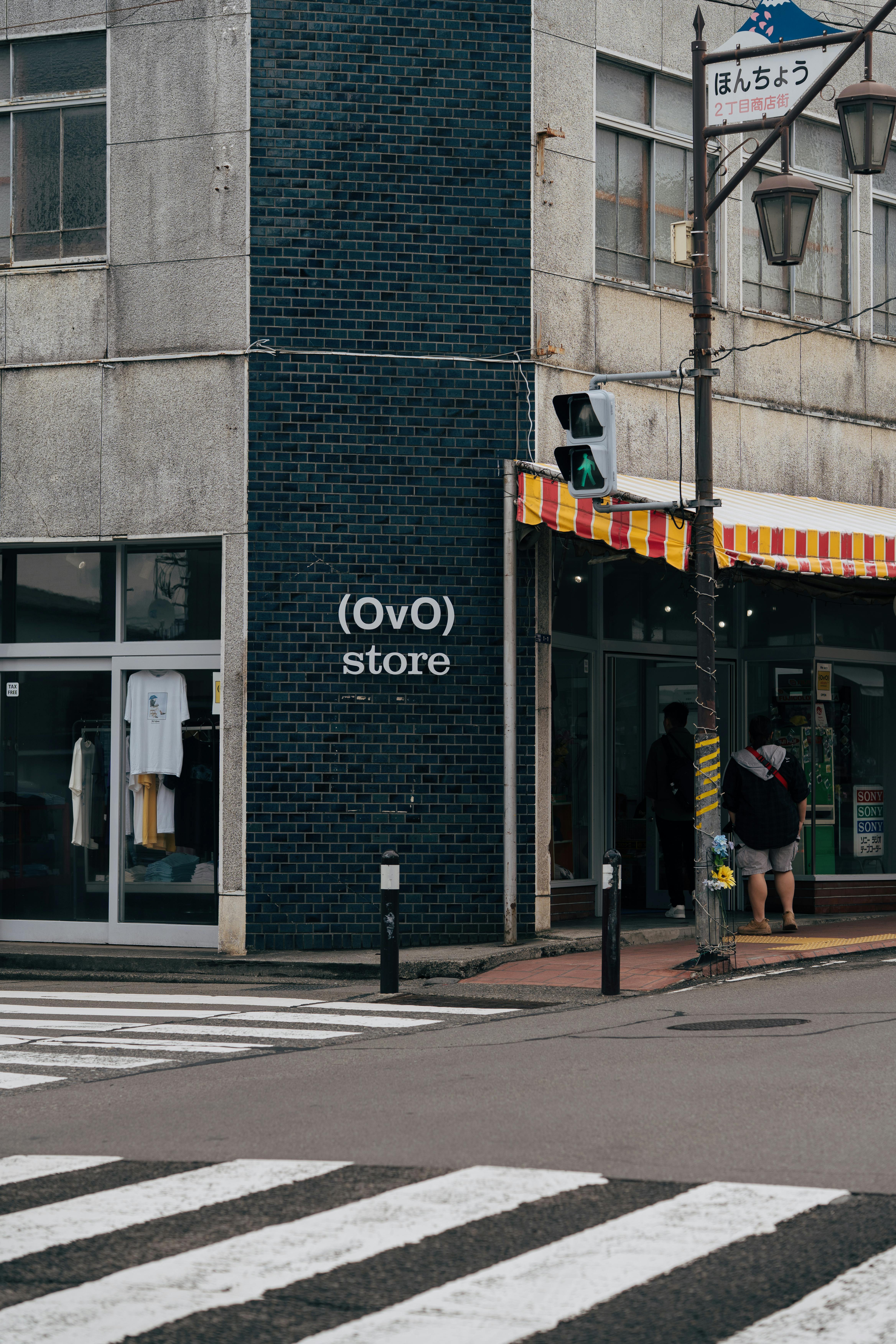 Street Scene Outside Vintage Yokosuka Storefront · Free Stock Photo