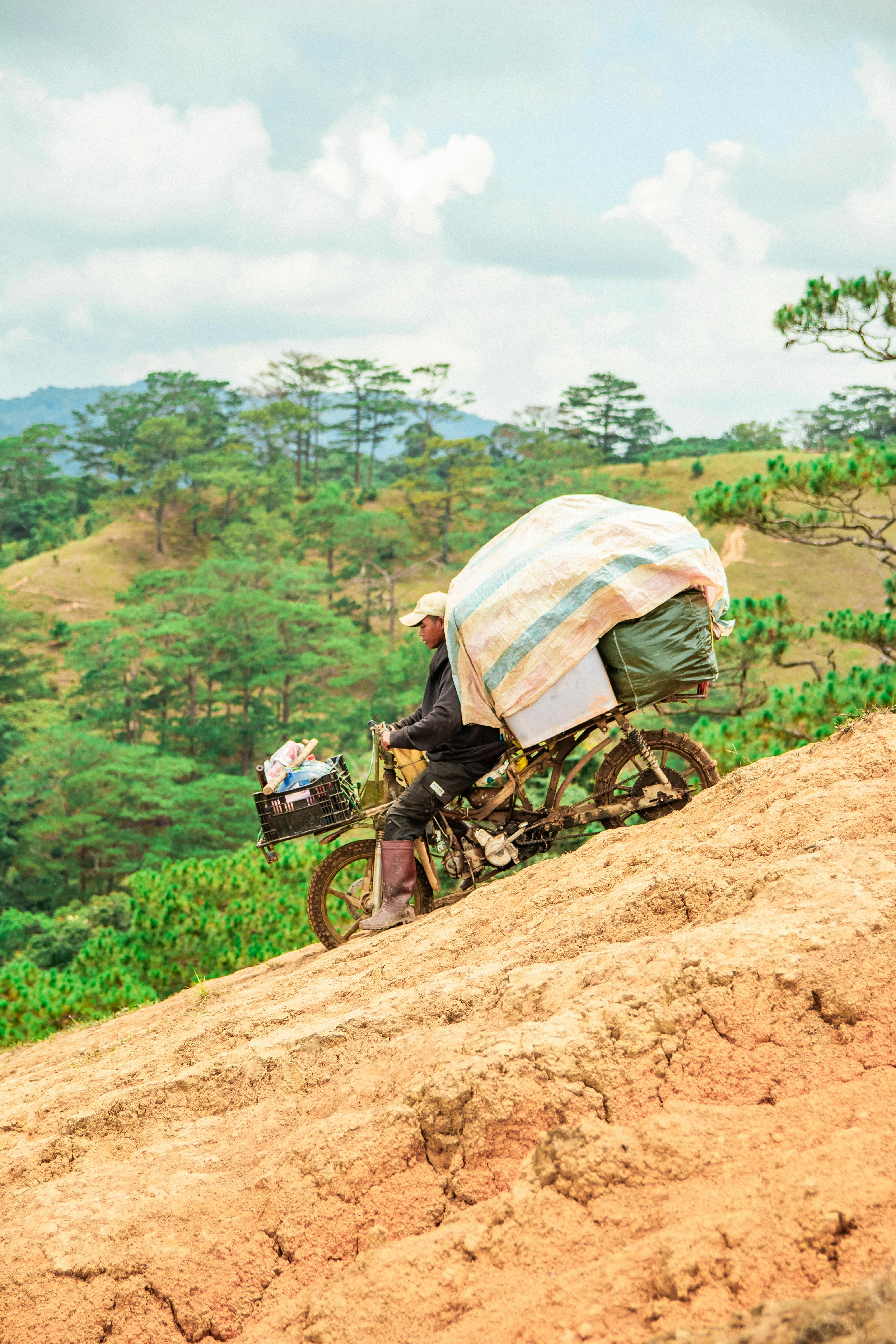 Rugged Journey on a Loaded Motorbike in Vietnam · Free Stock Photo