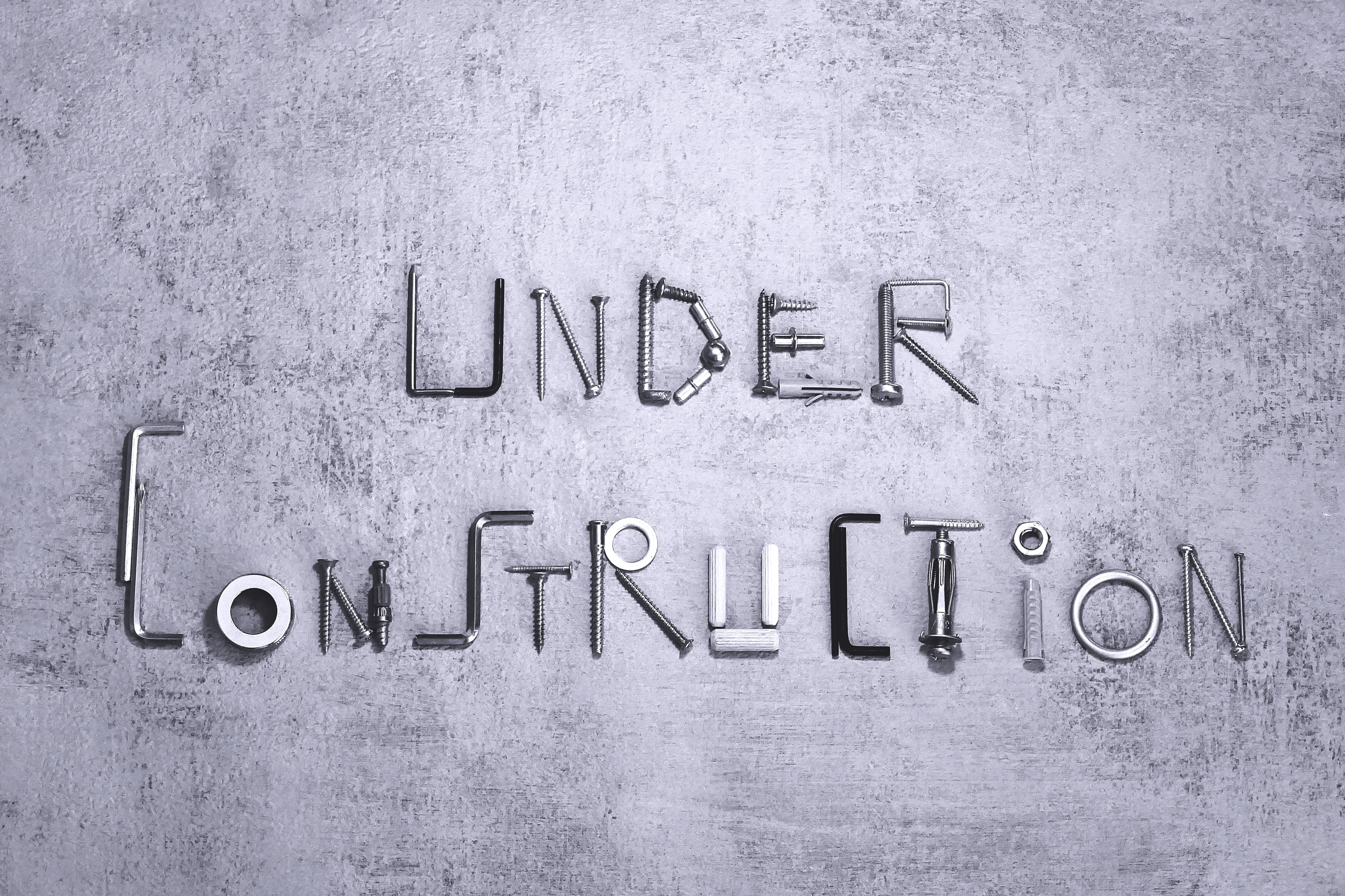 Creative Under Construction Word Art with Tools · Free Stock Photo