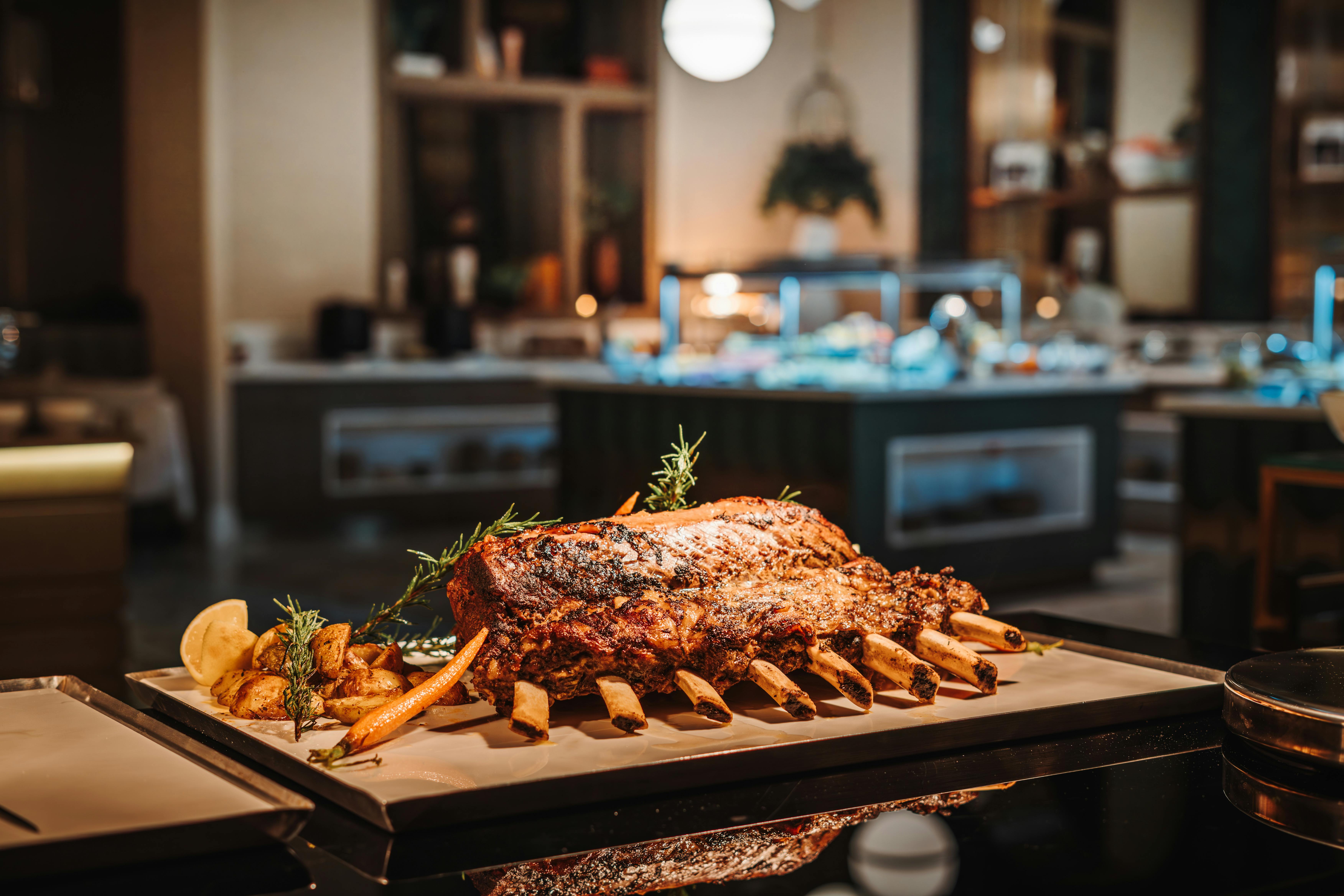 Succulent Rib Roast in Elegant Restaurant Setting · Free Stock Photo