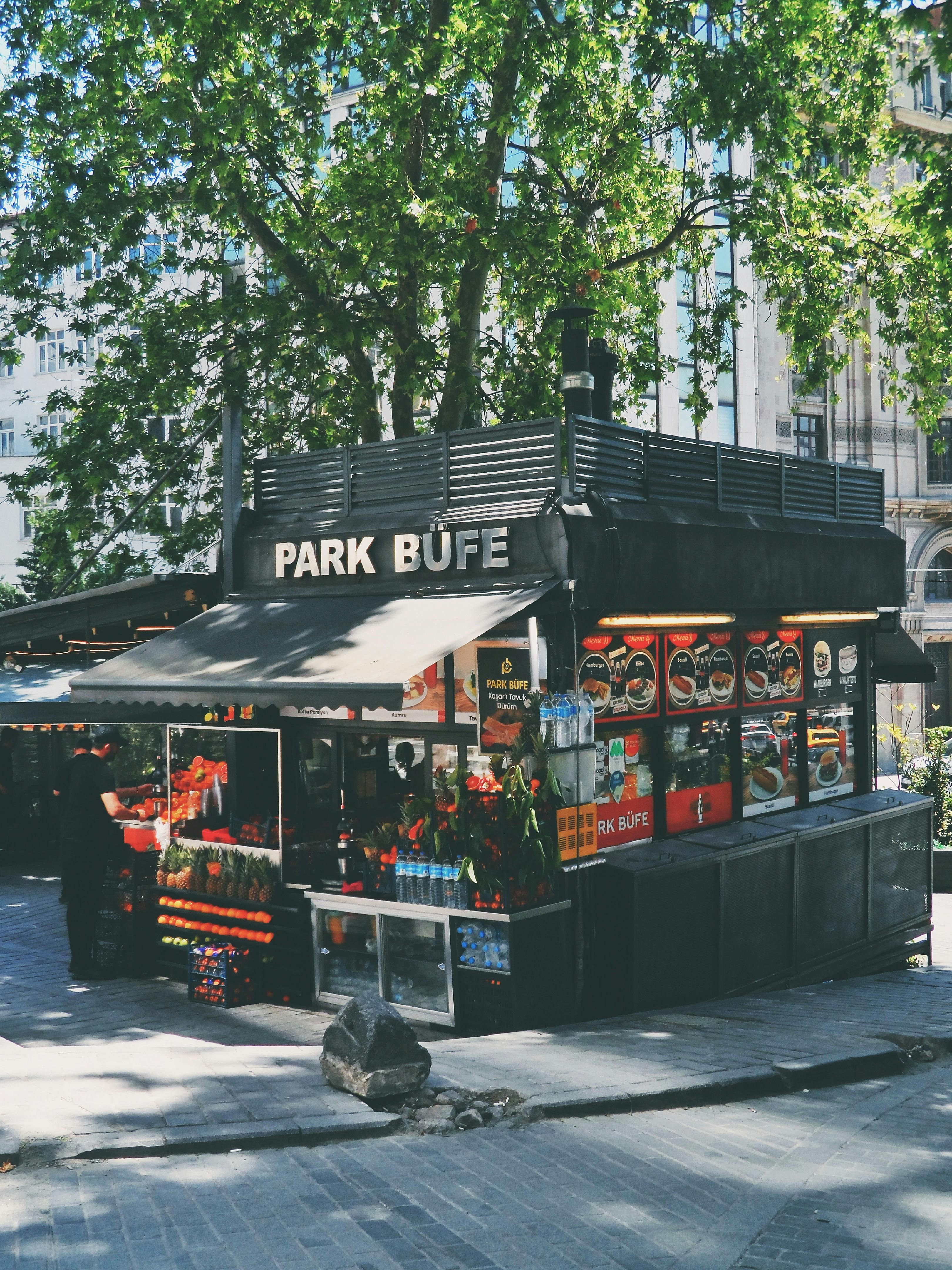 Outdoor Snack Kiosk in Urban Park Setting · Free Stock Photo