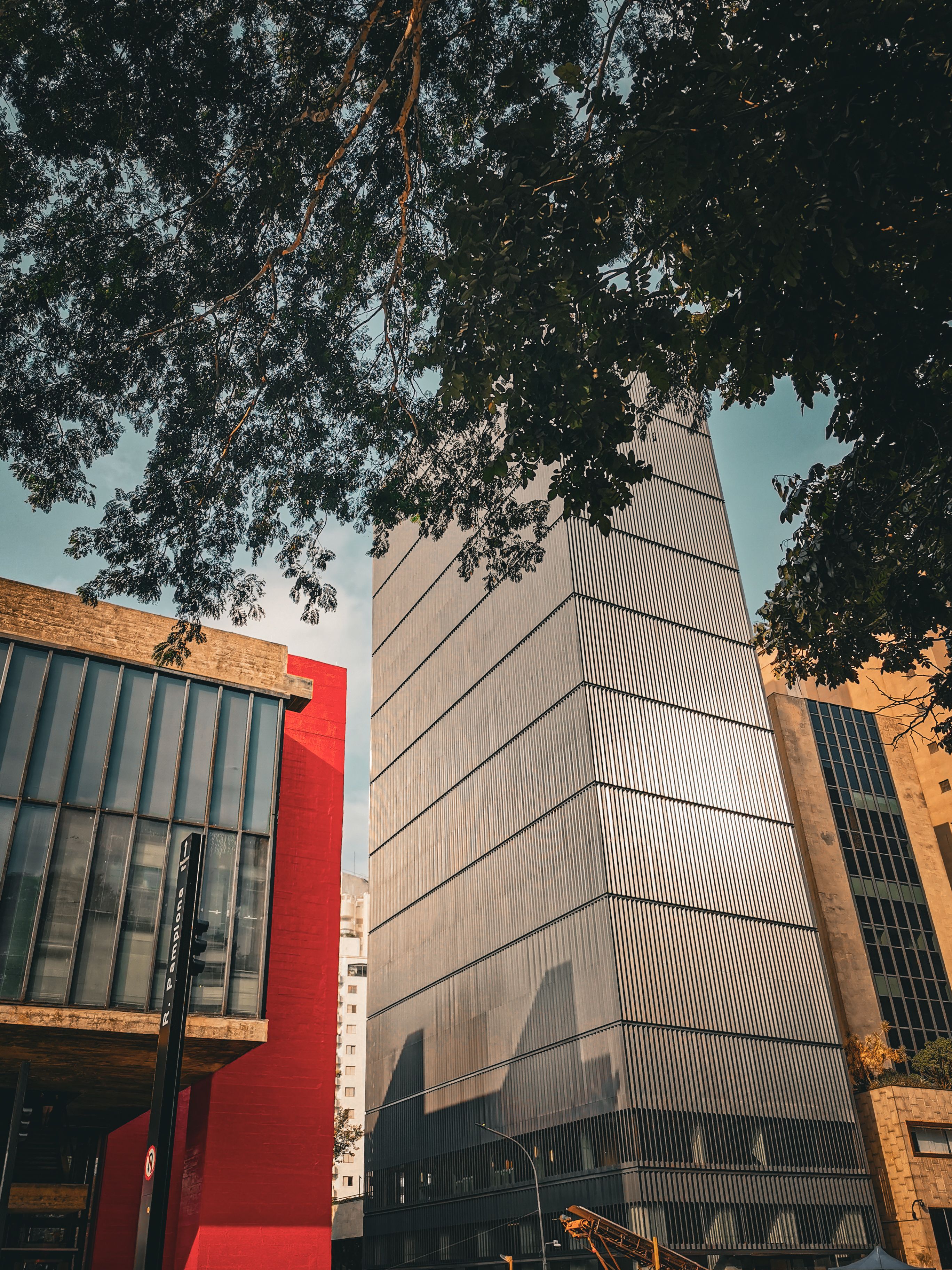 Modern Architectural Building Surrounded by Trees · Free Stock Photo