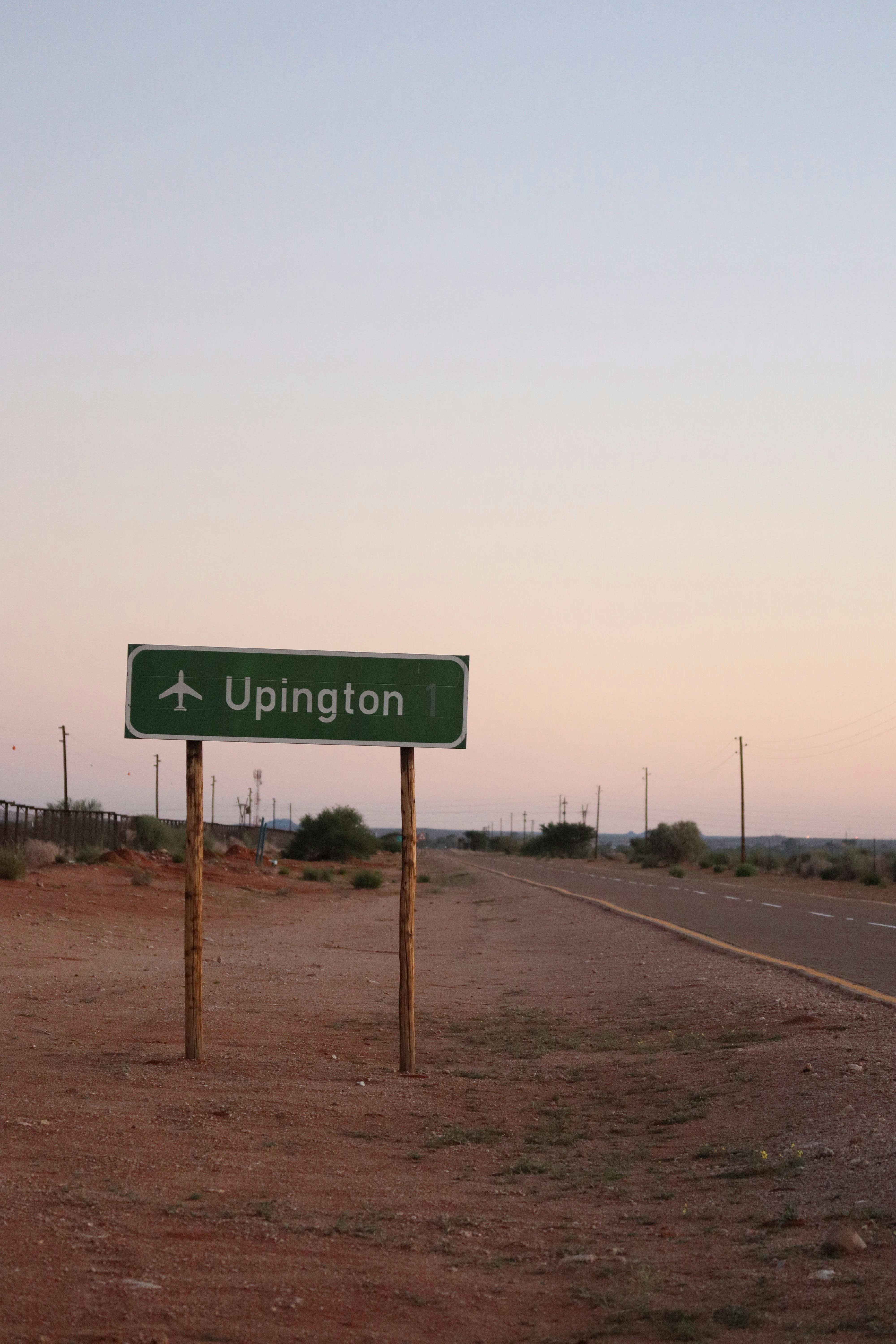 Upington Road Sign at Sunset in South Africa · Free Stock Photo