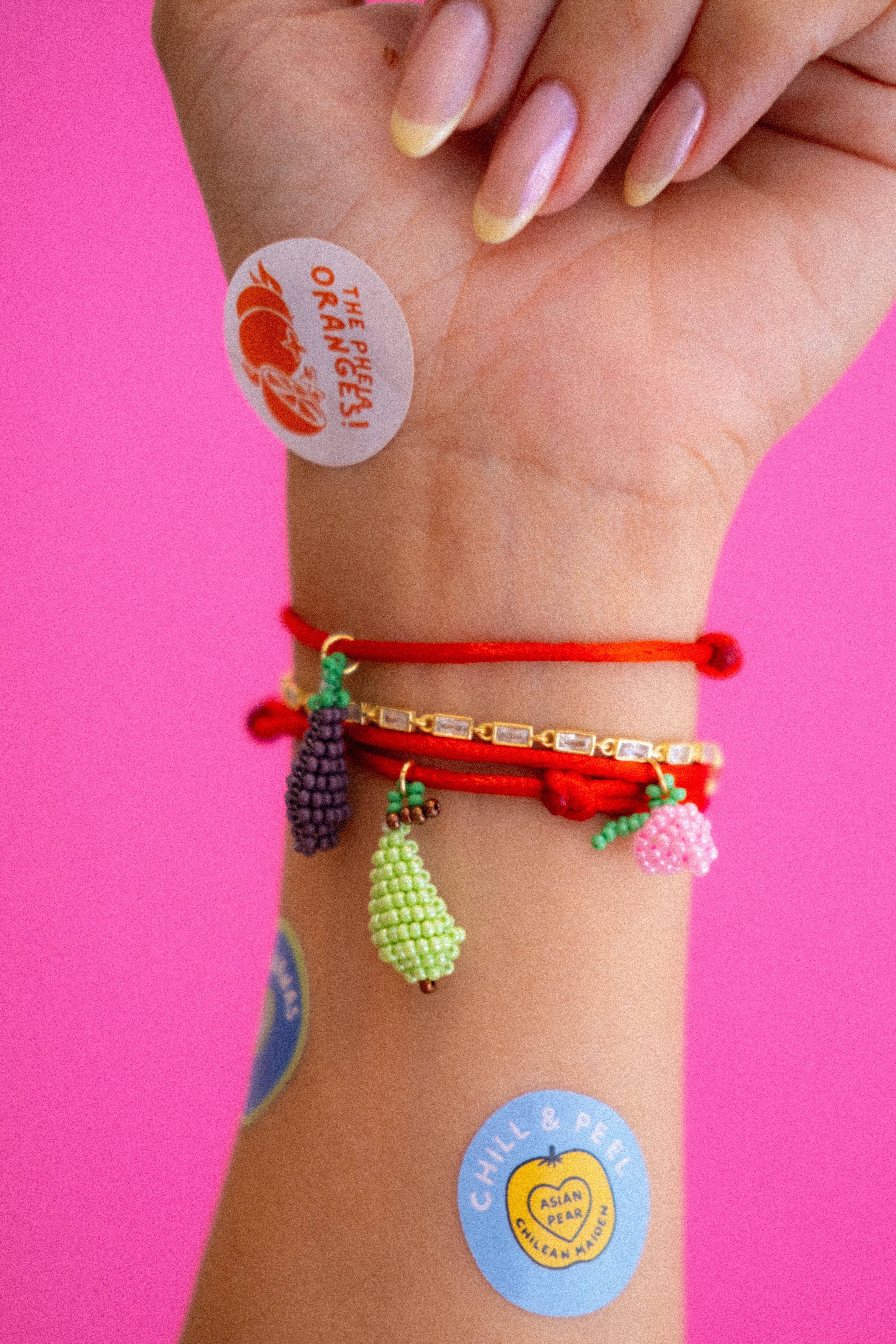 Colorful Beaded Bracelets on Wrist with Stickers · Free Stock Photo
