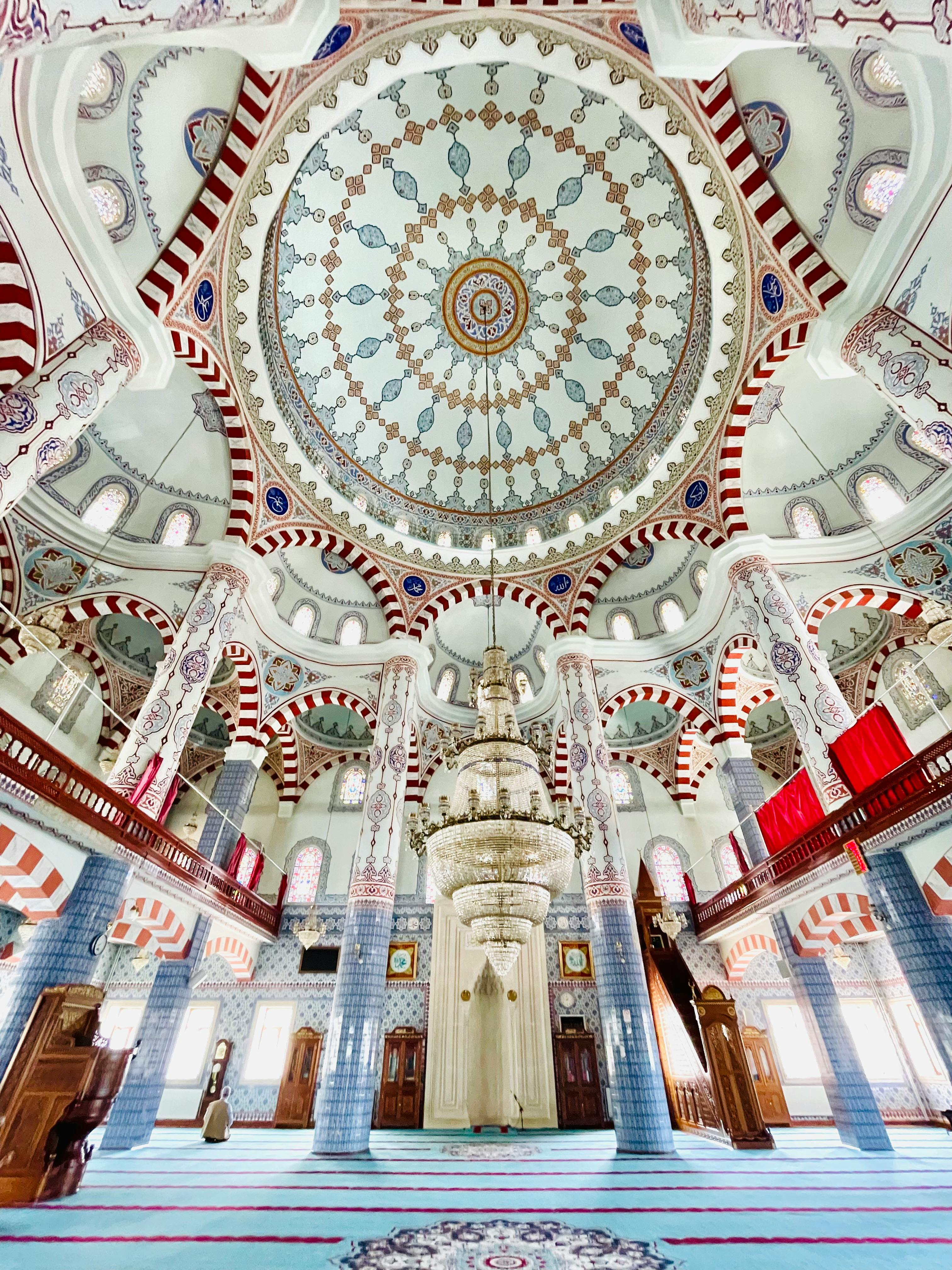 Stunning Interior of a Grand Mosque with Intricate Dome · Free Stock Photo
