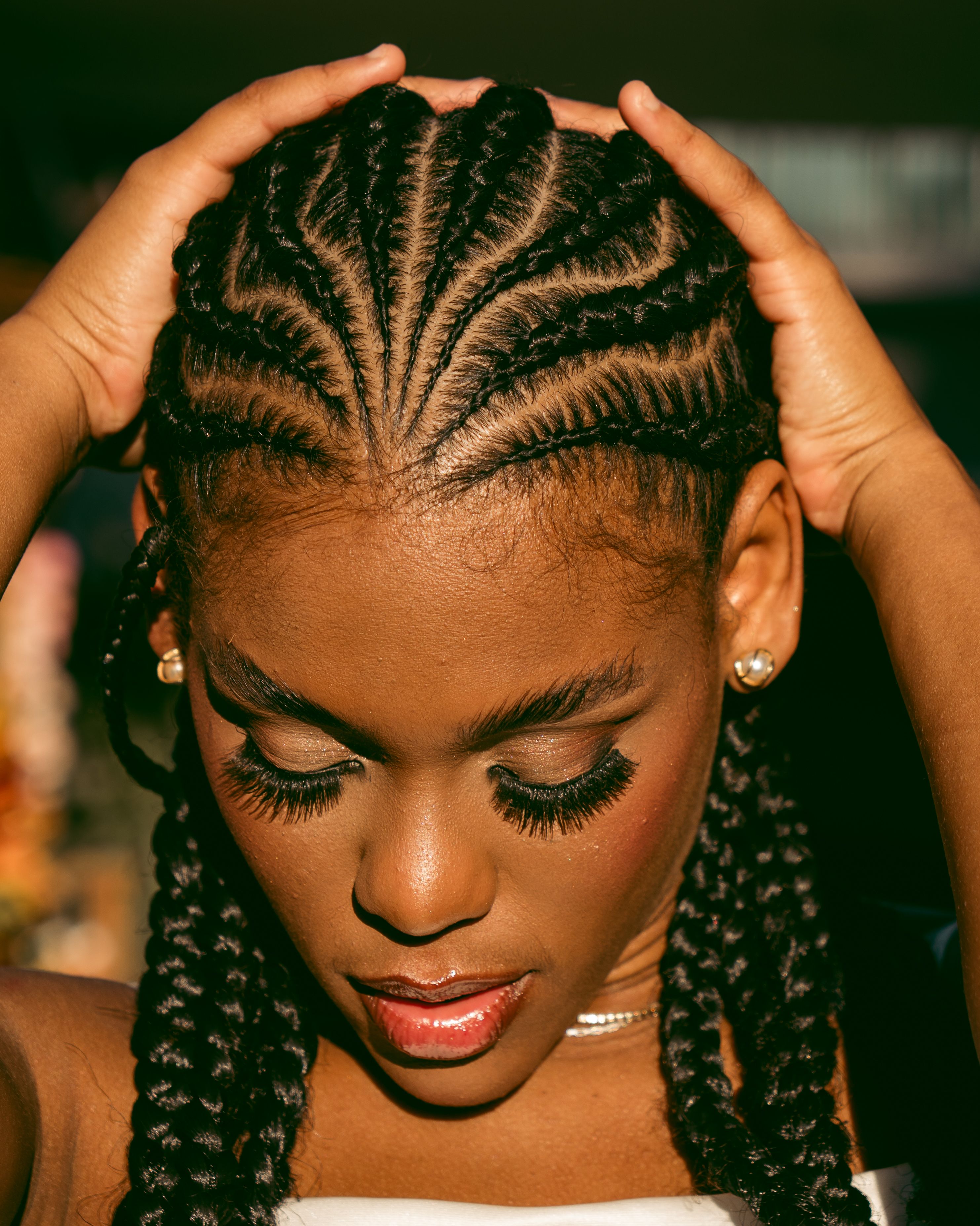 Close-up Portrait of Woman with Braided Hair · Free Stock Photo