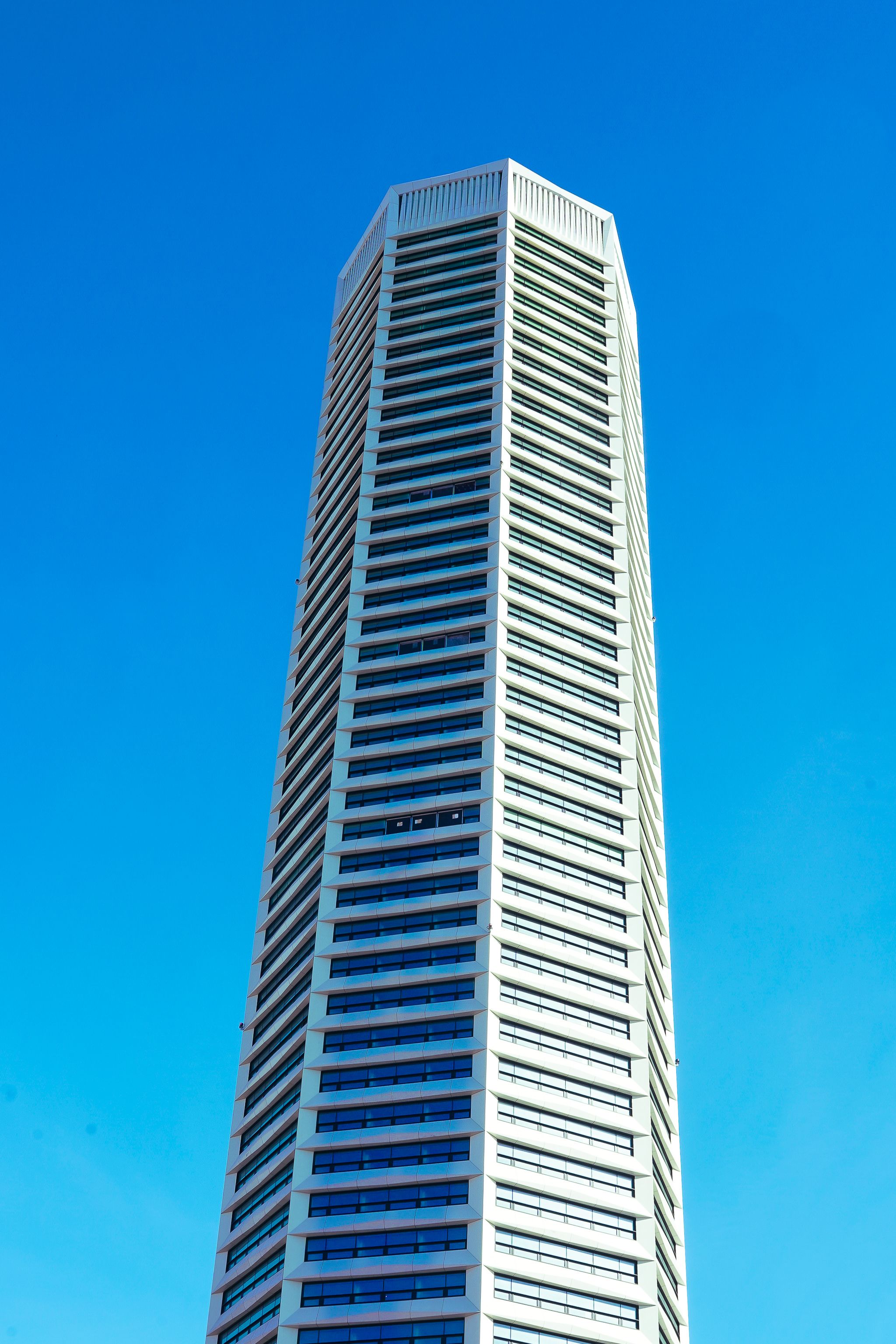 Modern Skyscraper Against Clear Blue Sky · Free Stock Photo