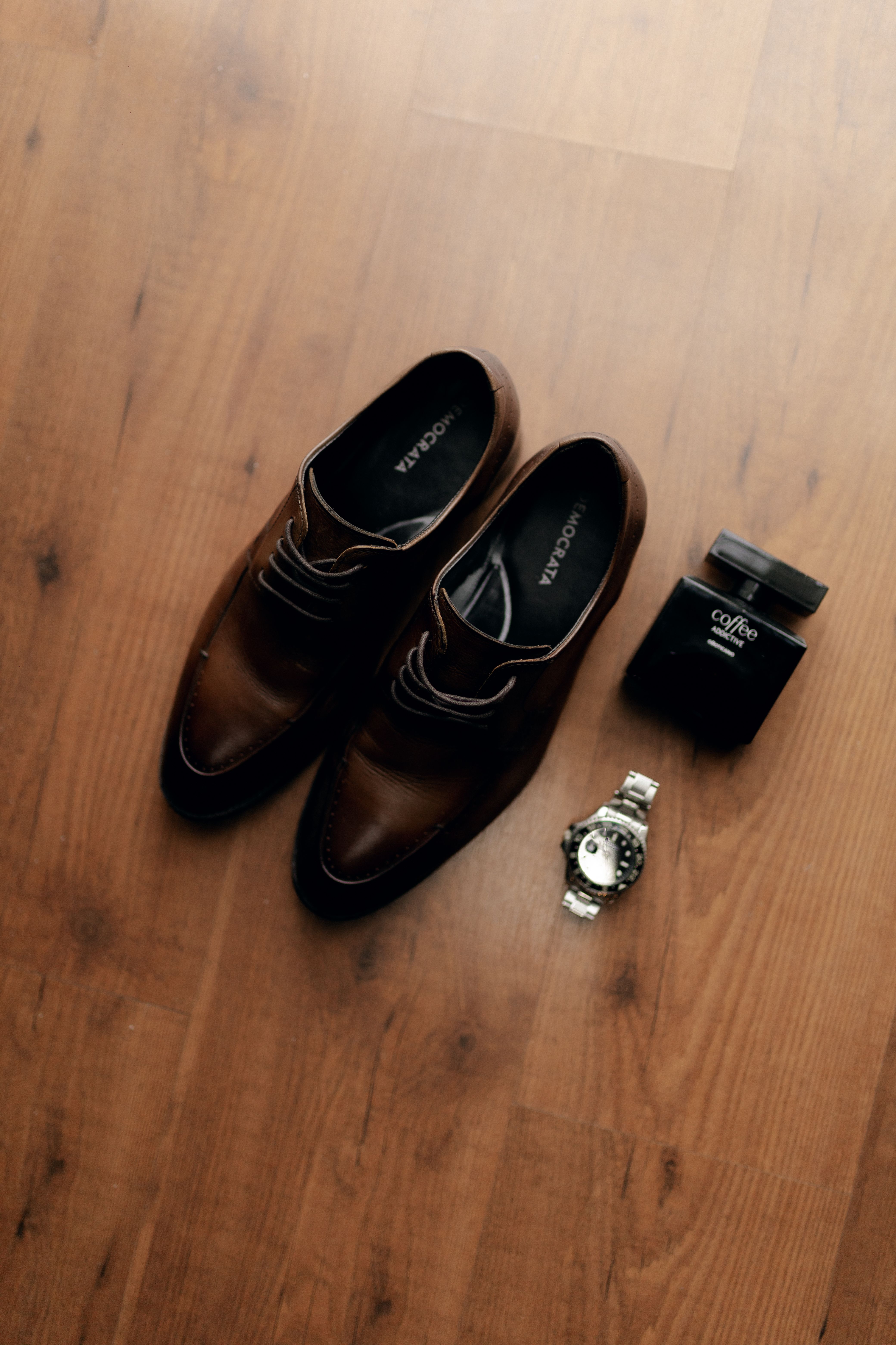 Elegant Leather Shoes with Watch and Perfume on Wooden Floor · Free ...