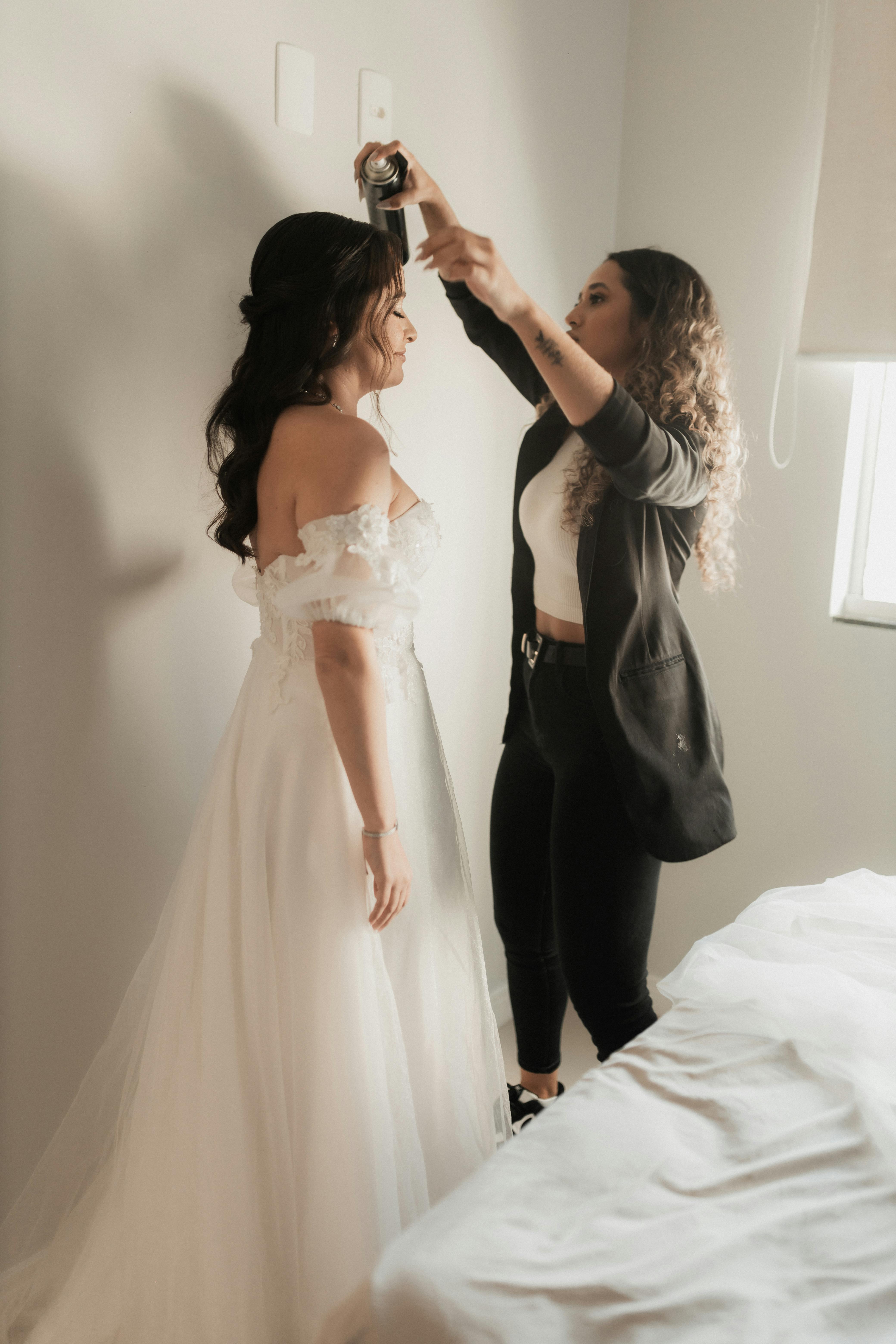 Bride Preparing for Wedding with Hairstylist · Free Stock Photo