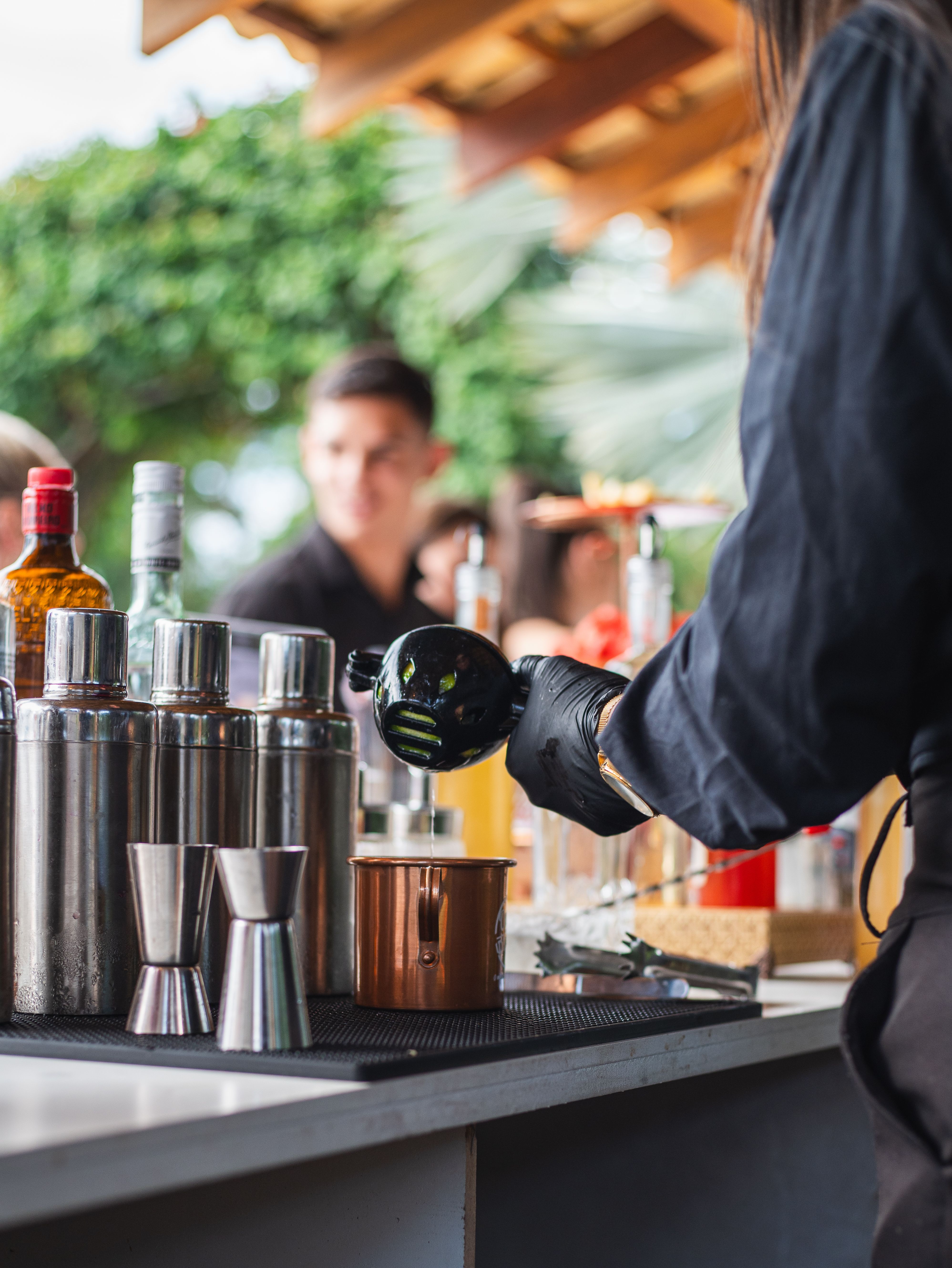 Professional Bartender Preparing Classic Cocktails · Free Stock Photo