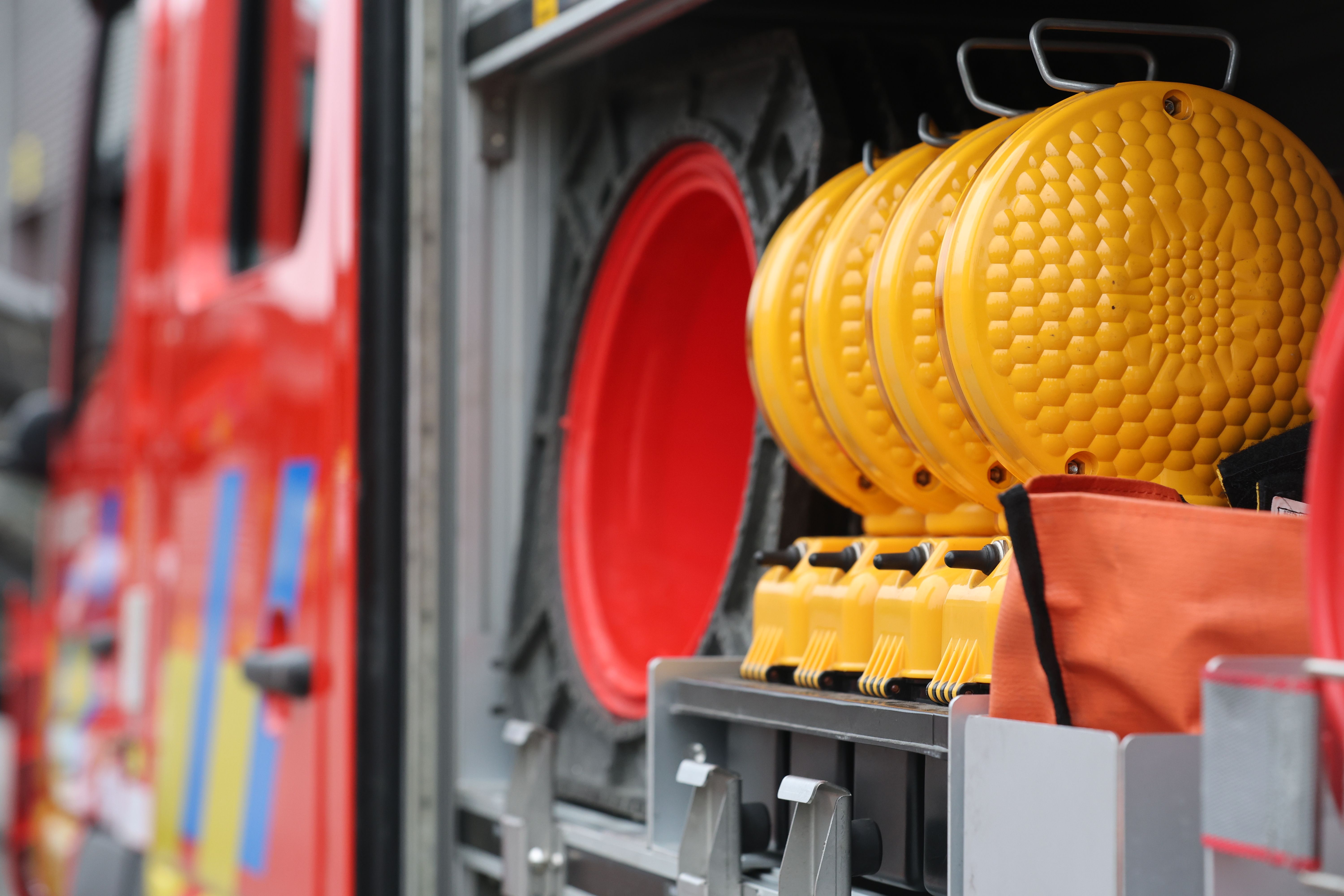 Fire Truck Equipment Storage with Bright Safety Gear · Free Stock Photo