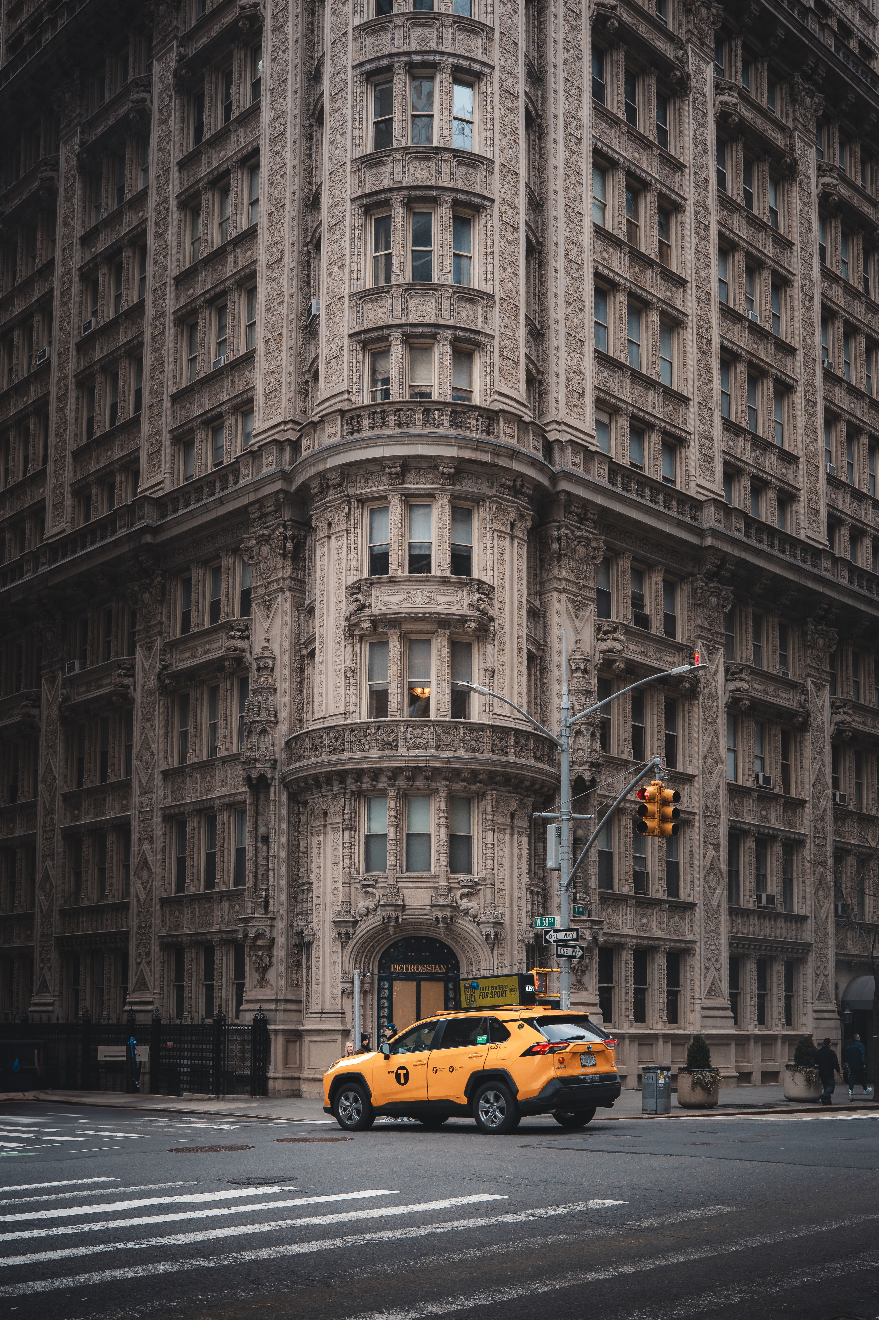 Yellow Taxi in Front of Historic New York Building · Free Stock Photo