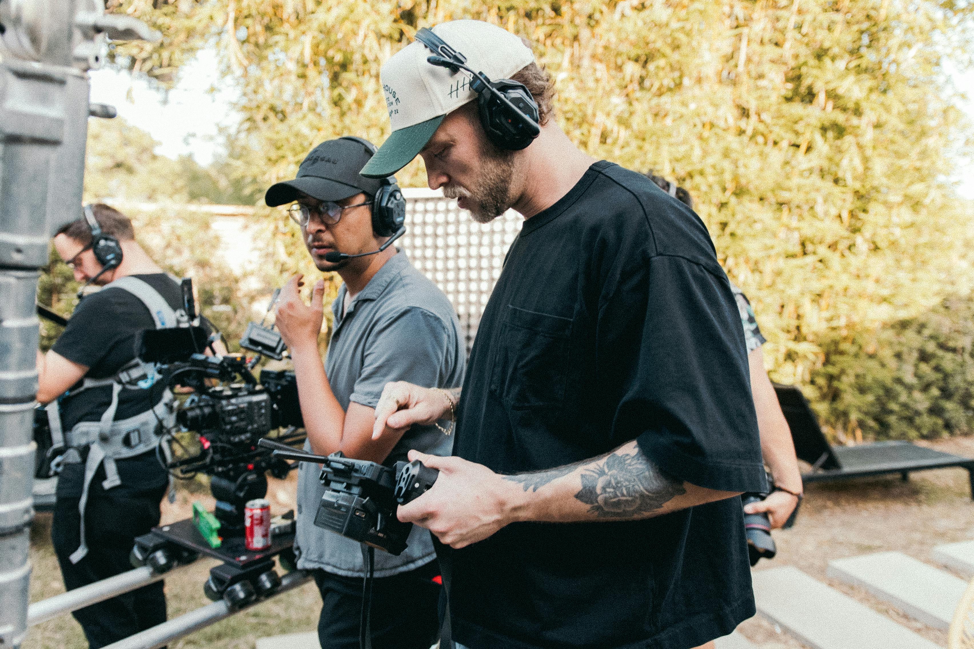 Photo Of People Filming On Set · Free Stock Photo