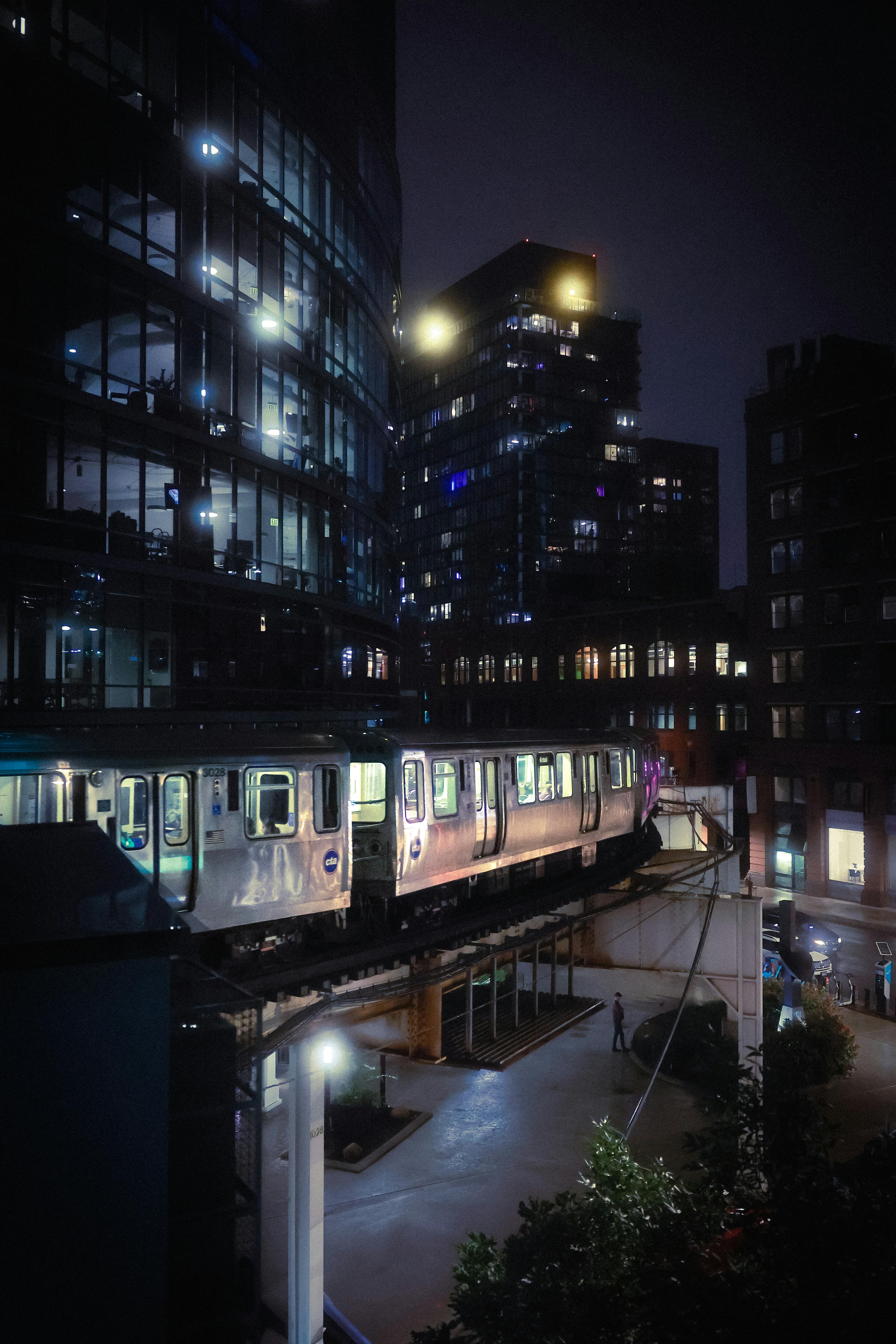 Nighttime Cityscape with Subway Train · Free Stock Photo