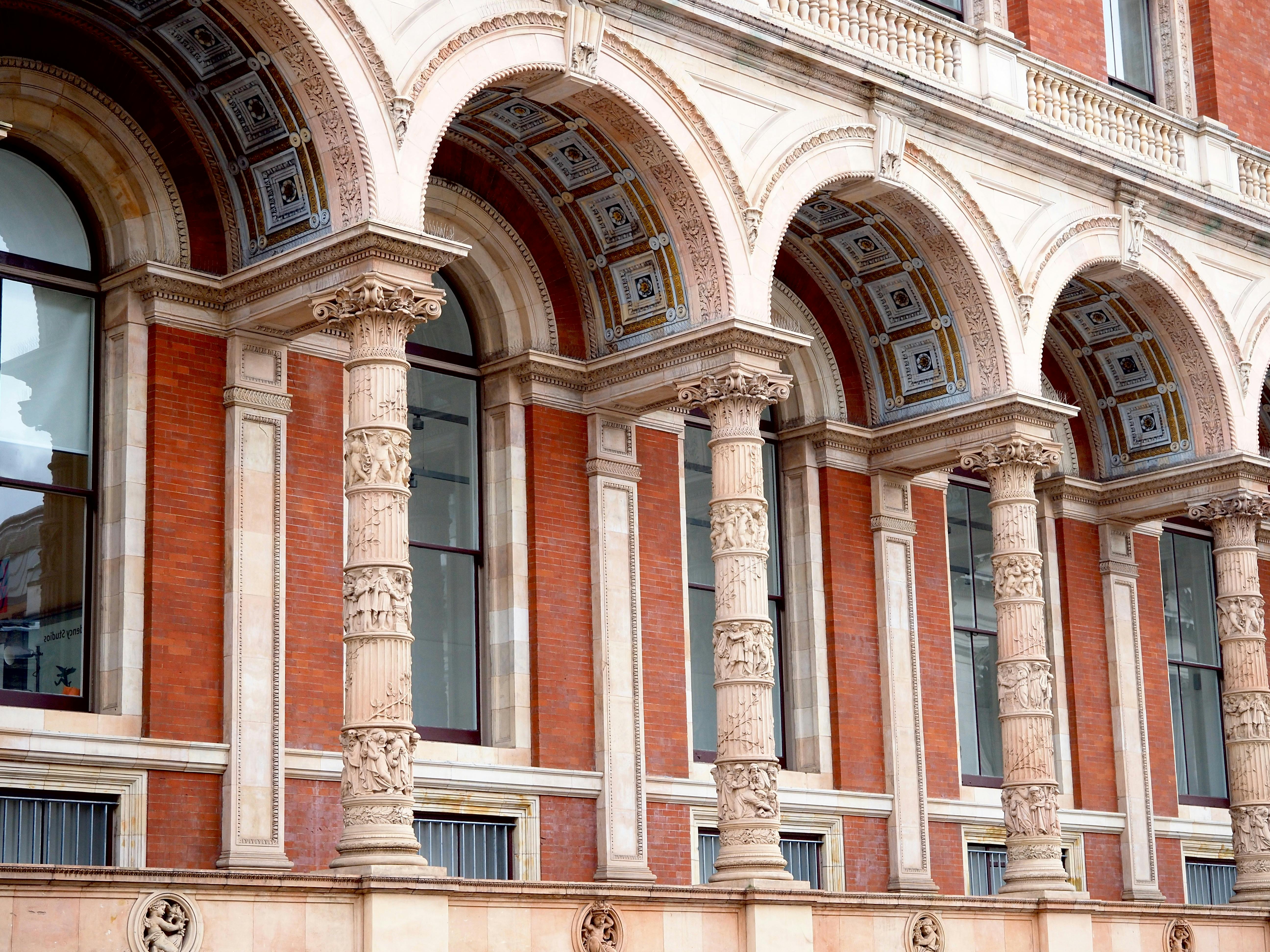 Victorian Architecture with Ornate Columns and Arches · Free Stock Photo