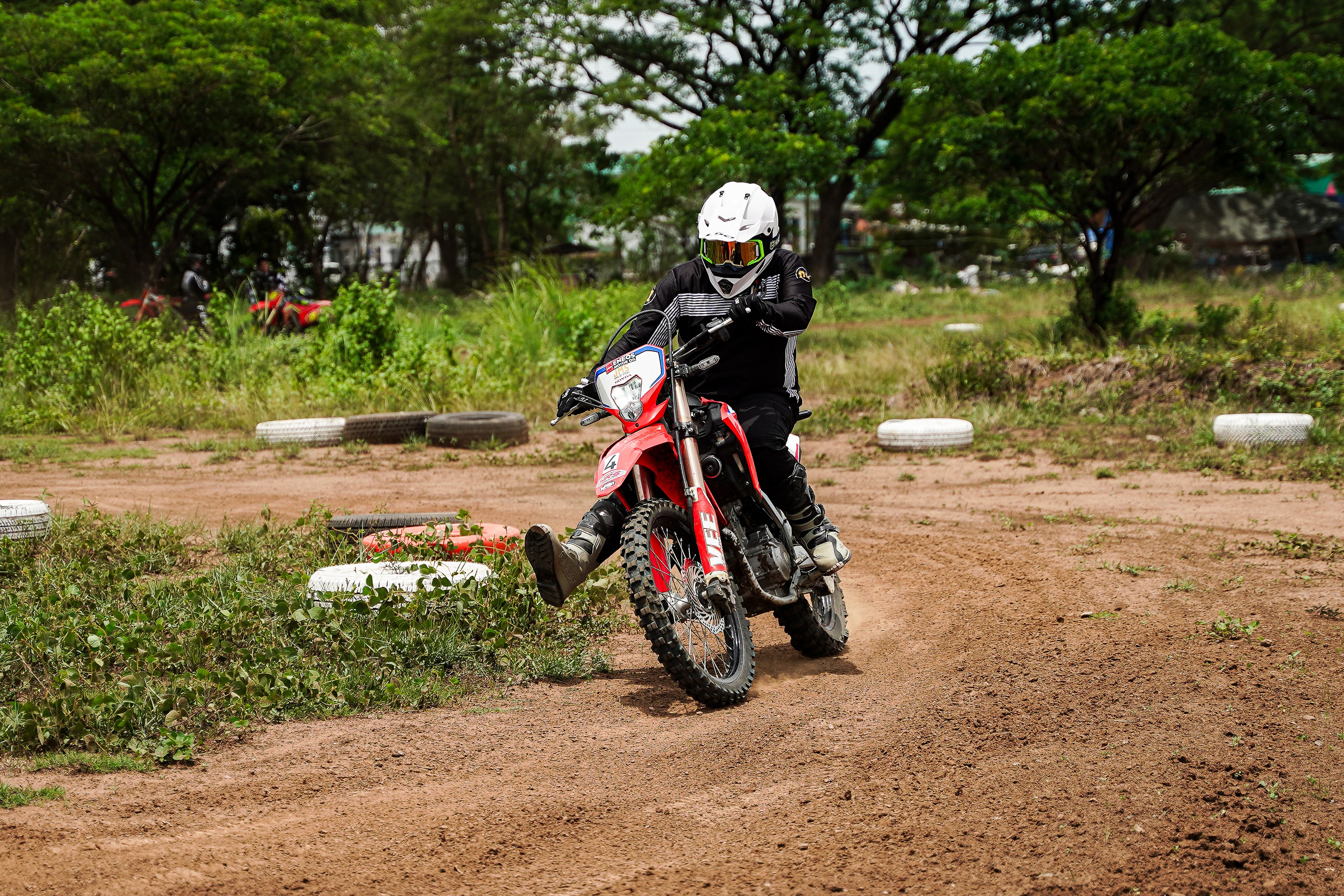 Motorcyclist Racing on Rural Dirt Track · Free Stock Photo