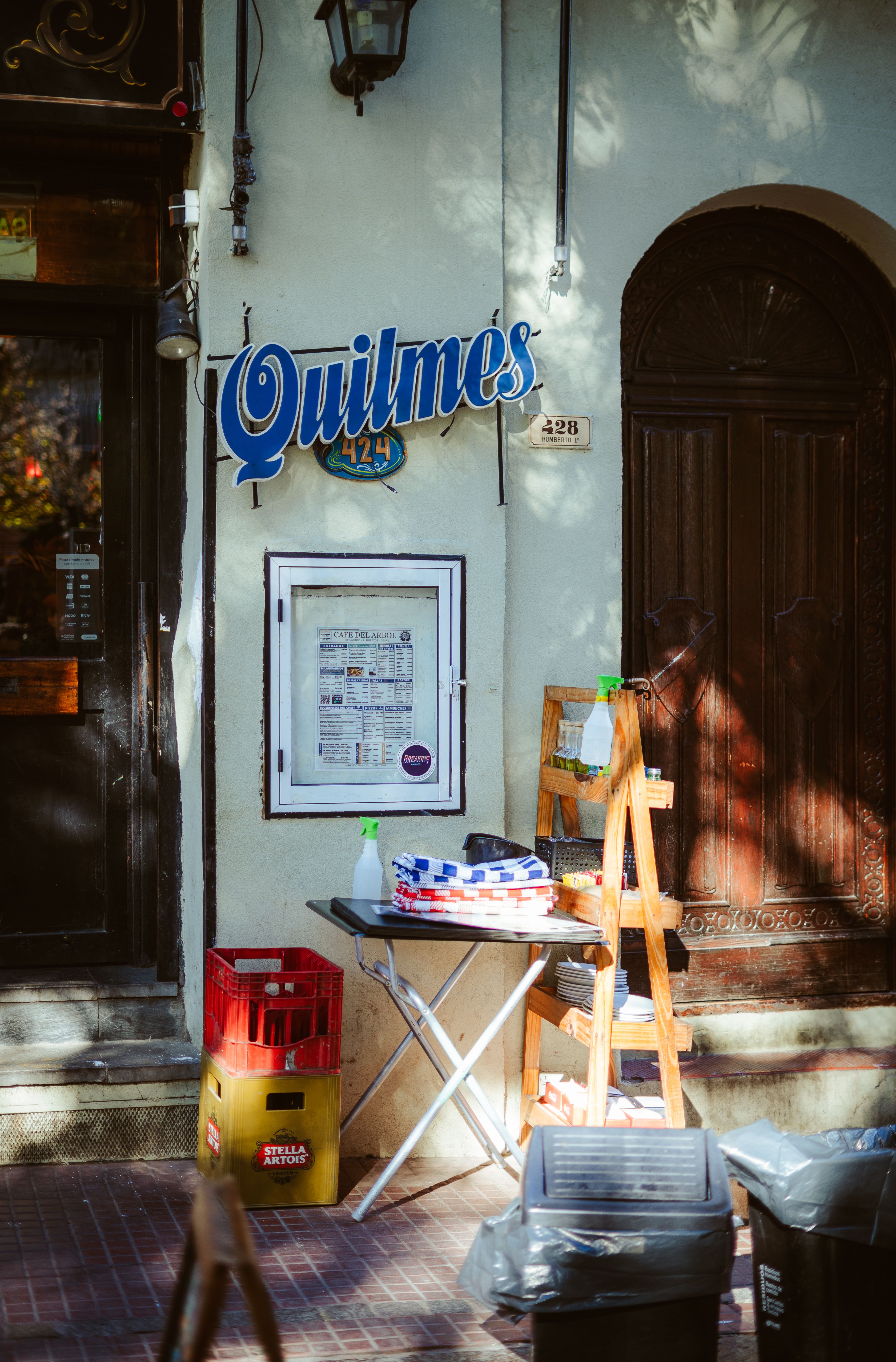 Street Scene in Buenos Aires with Quilmes Sign · Free Stock Photo