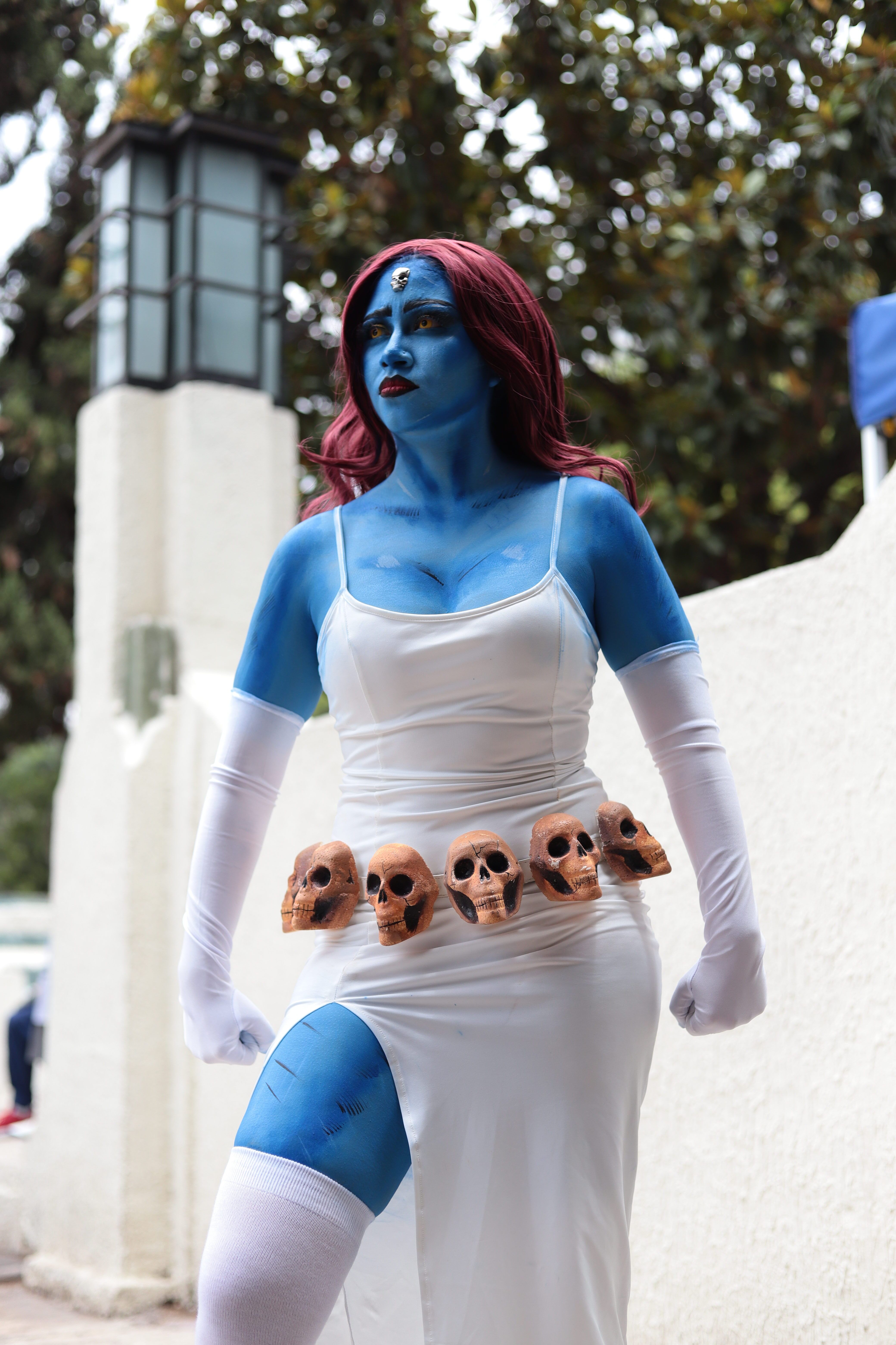 Blue-Skinned Cosplay Character in Skull Decor Outfit · Free Stock Photo