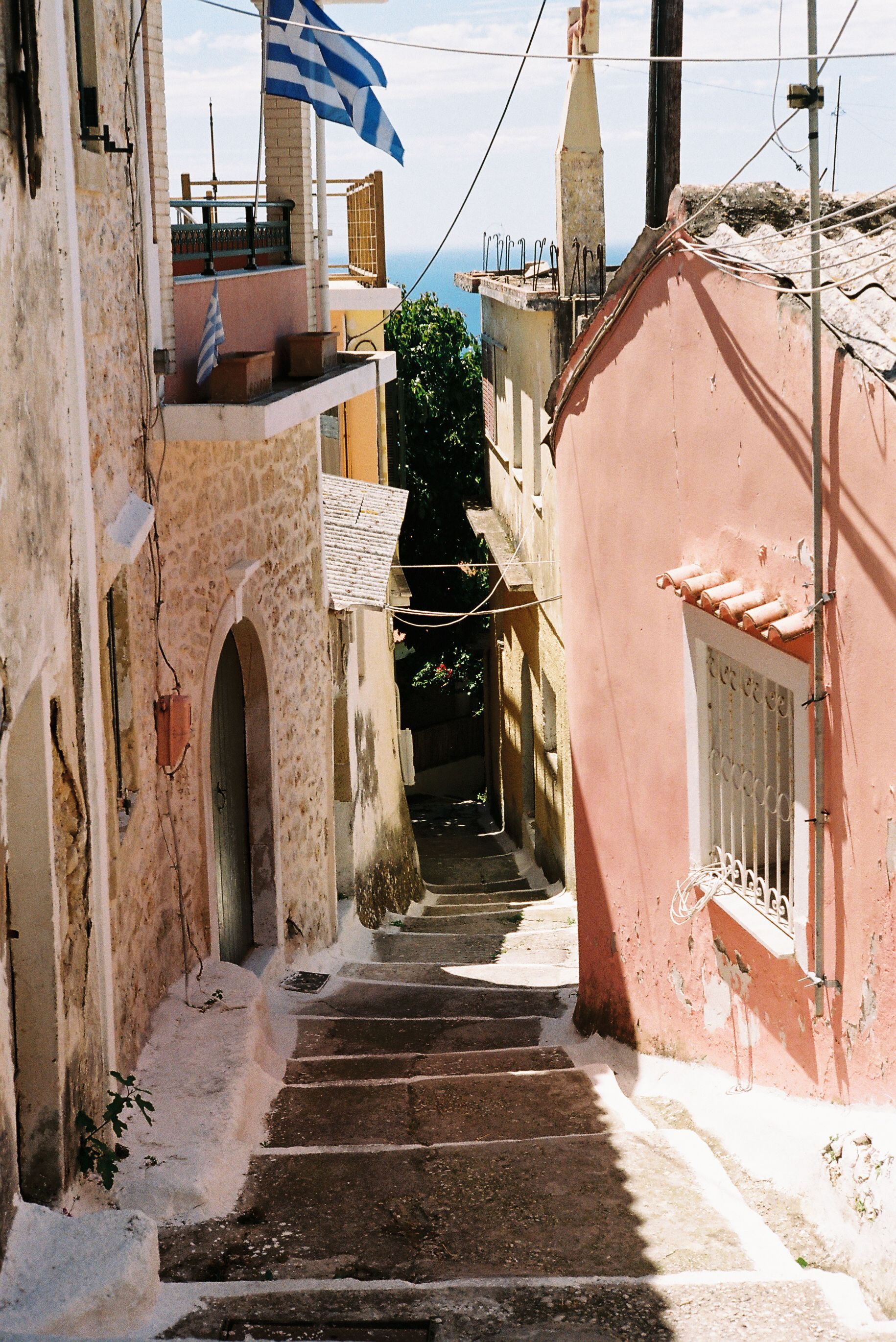 Charming Greek Alley with Mediterranean View · Free Stock Photo