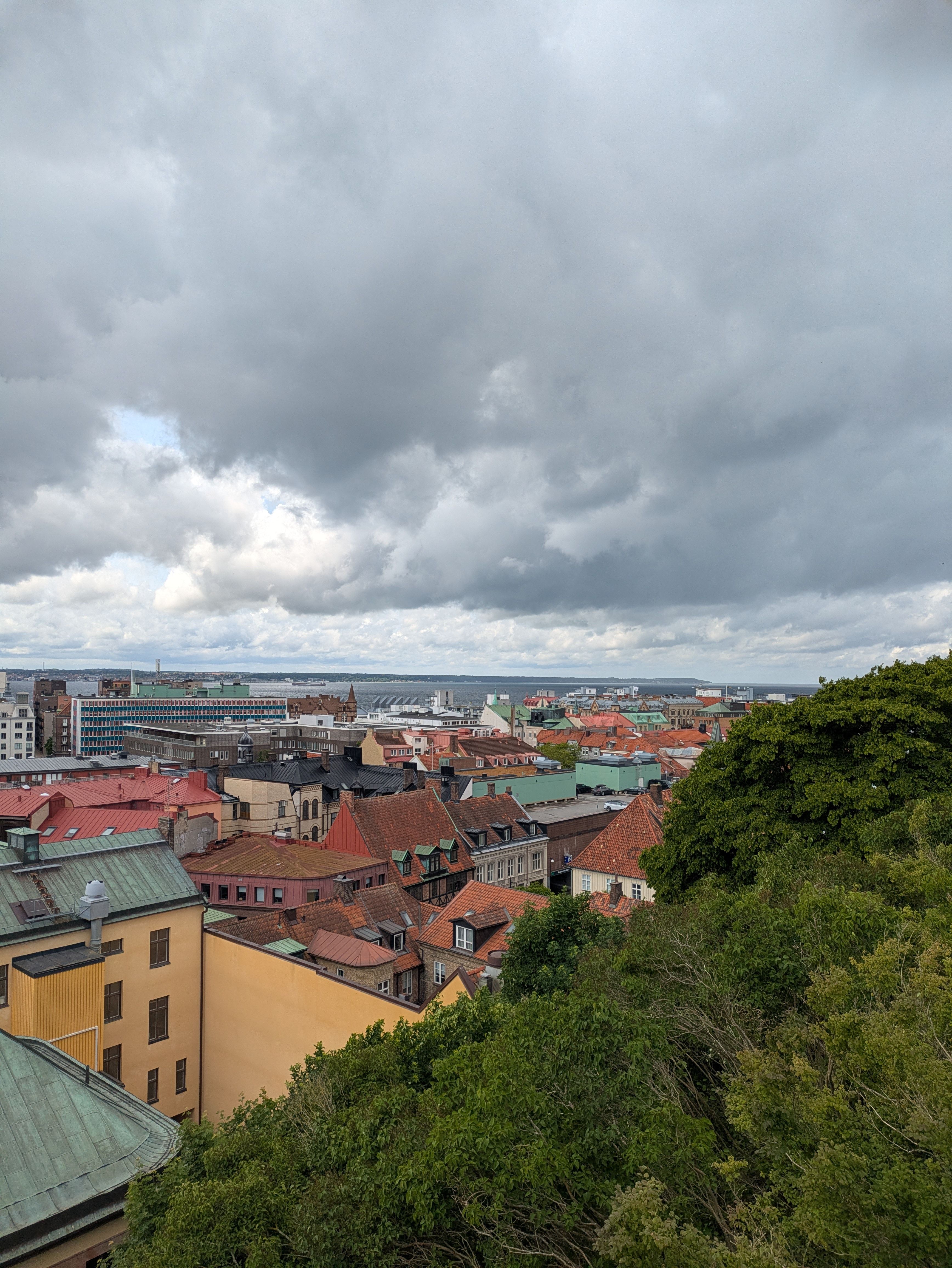 Overcast View of Gdańsk Old Town Rooftops · Free Stock Photo