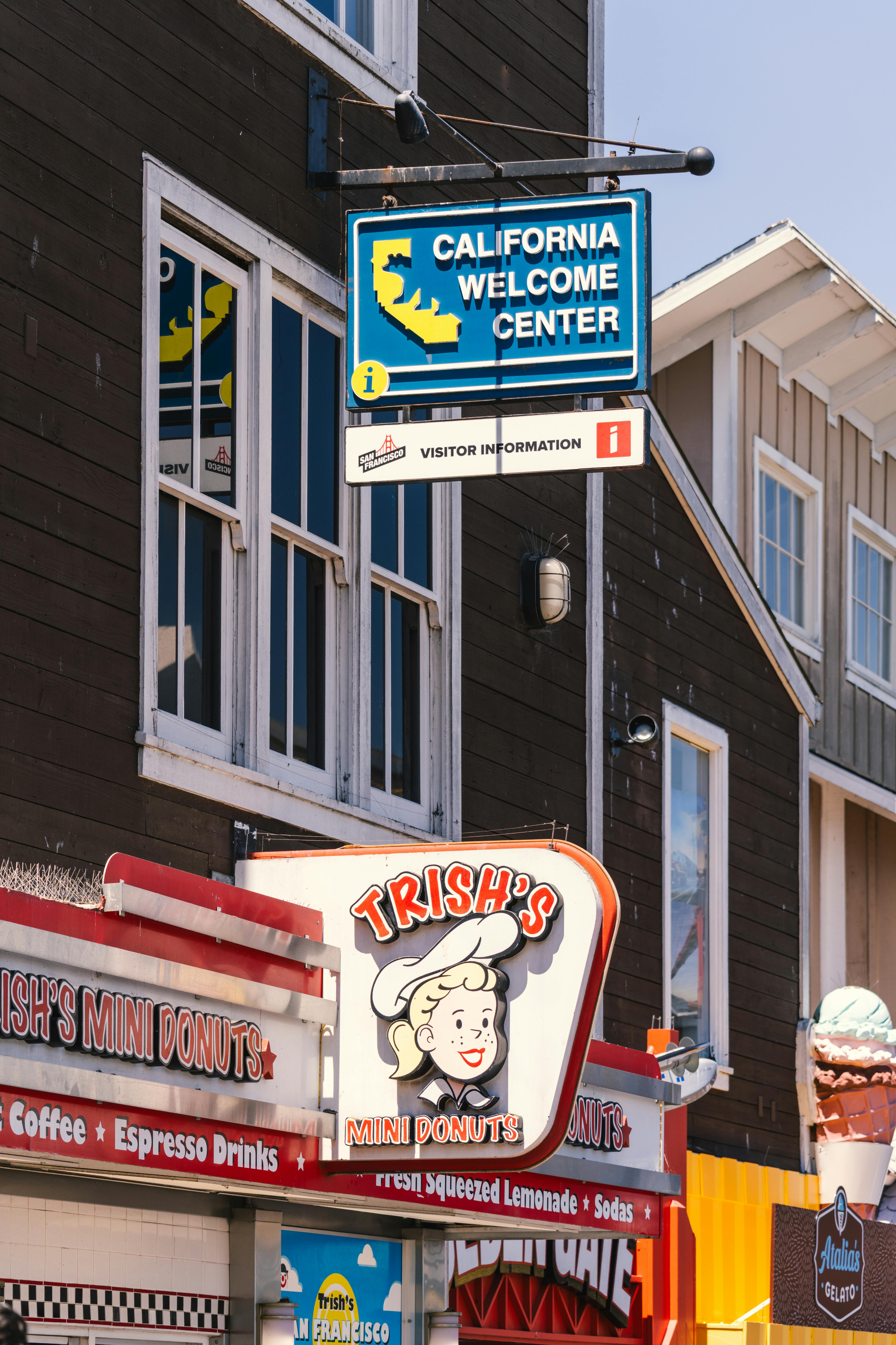 San Francisco California Welcome Center Sign on Building · Free Stock Photo