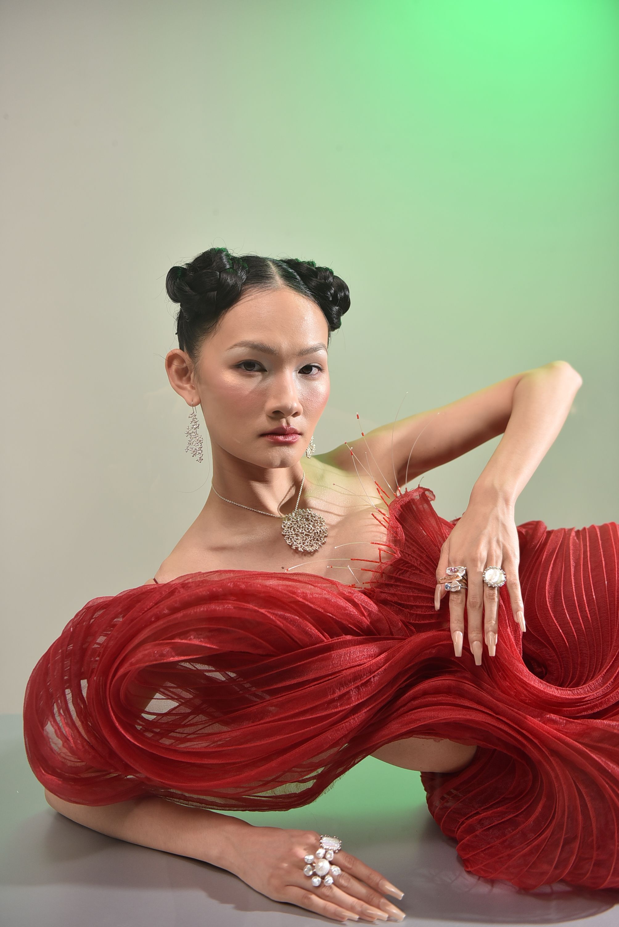 Elegant Woman in Dramatic Red Dress and Jewelry · Free Stock Photo