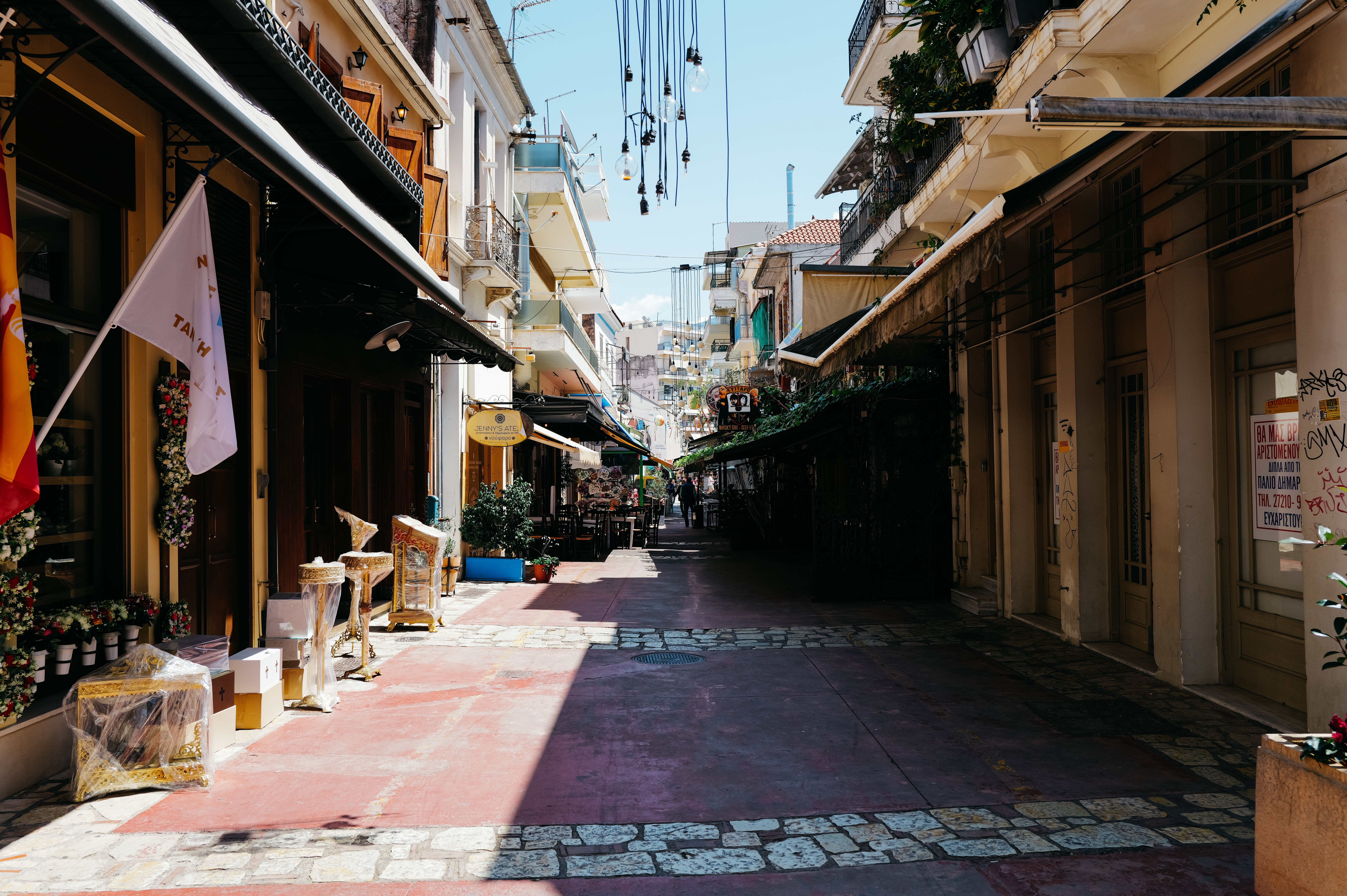 Charming European Street with Shops and Cafes · Free Stock Photo