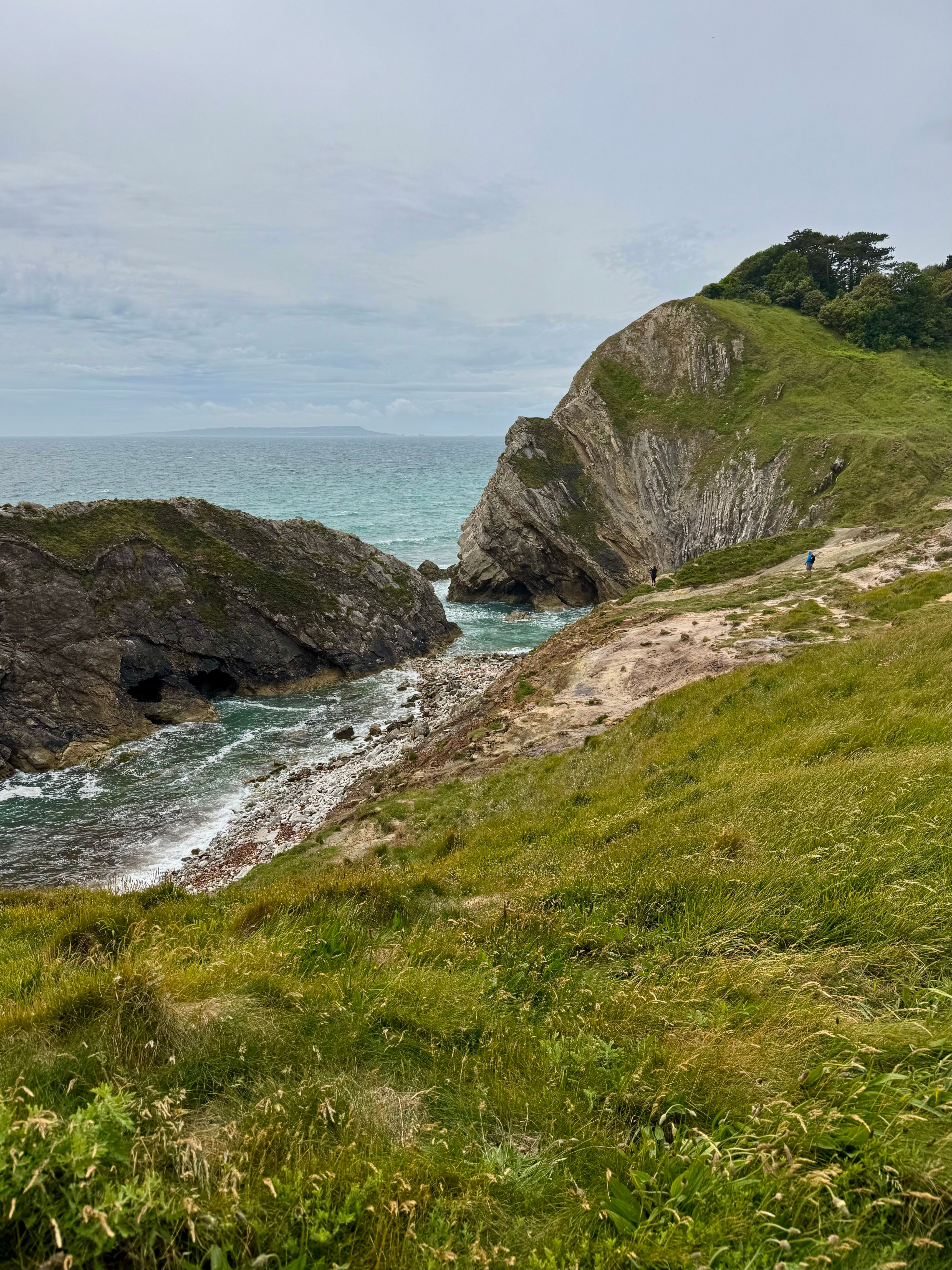 Scenic Coastal Cliffs and Green Hills Landscape · Free Stock Photo