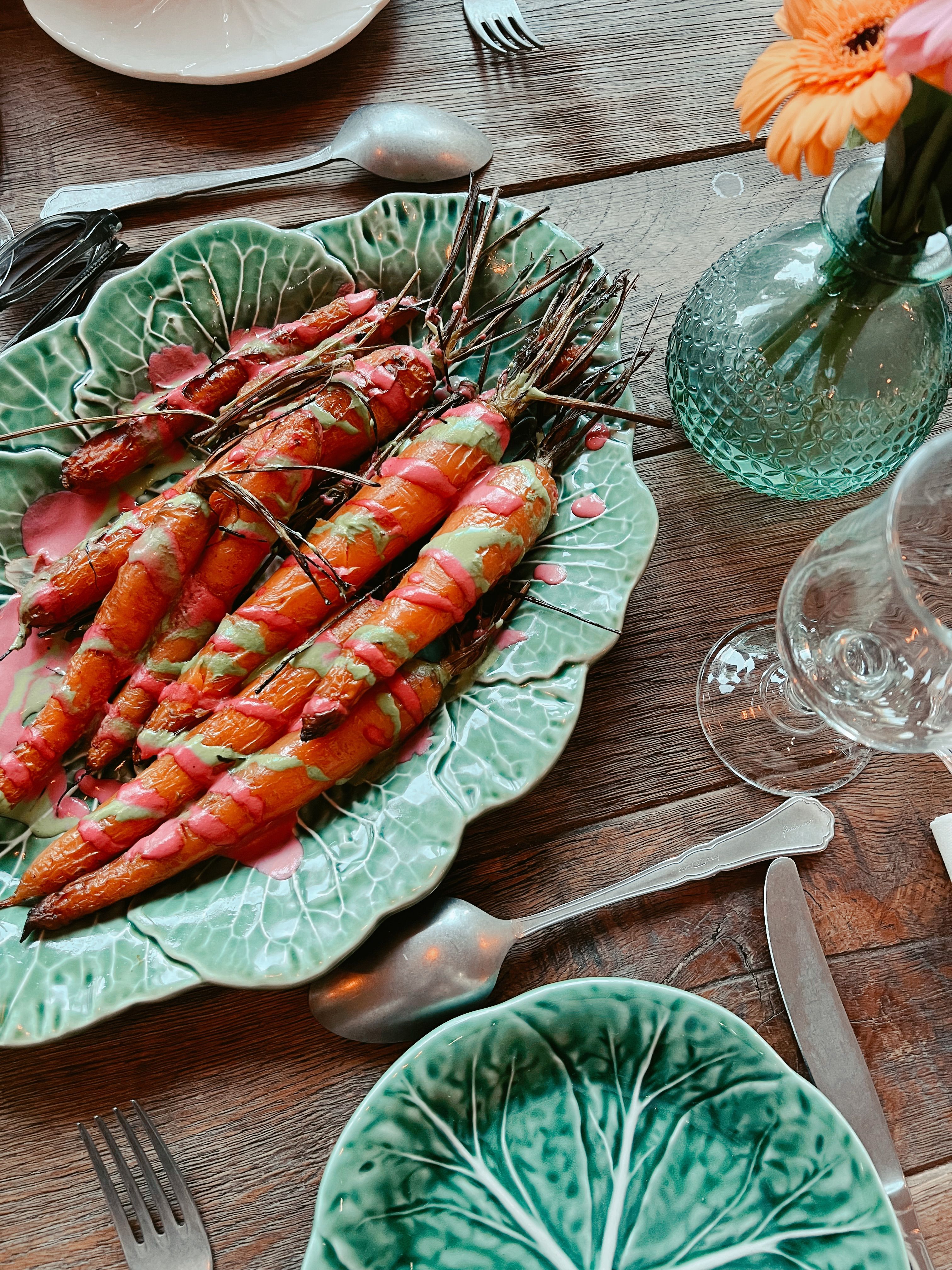 Rustic Roasted Carrots on Cabbage Leaf Plate · Free Stock Photo