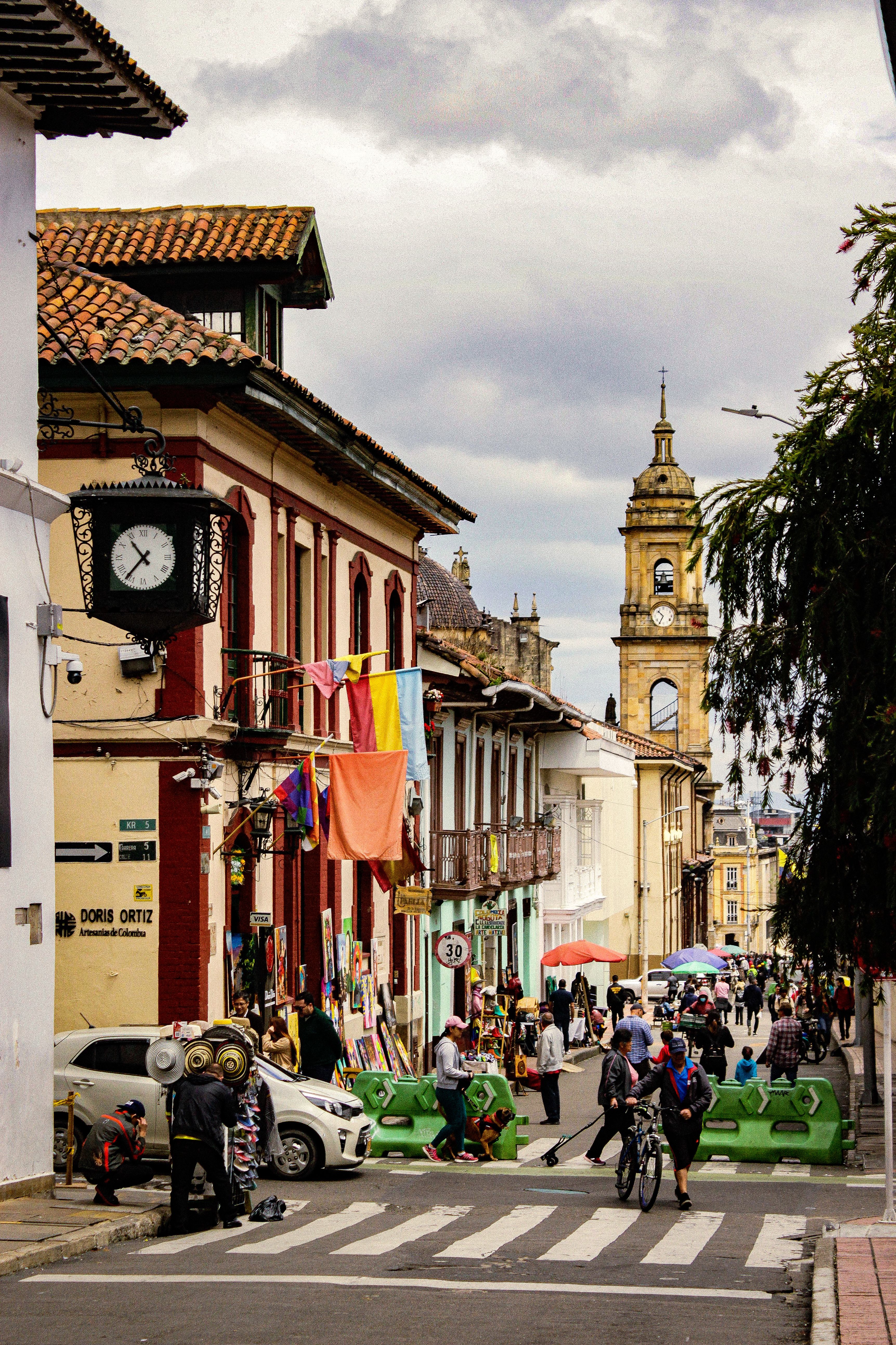 Bustling Street Scene in Historic Colombian City · Free Stock Photo
