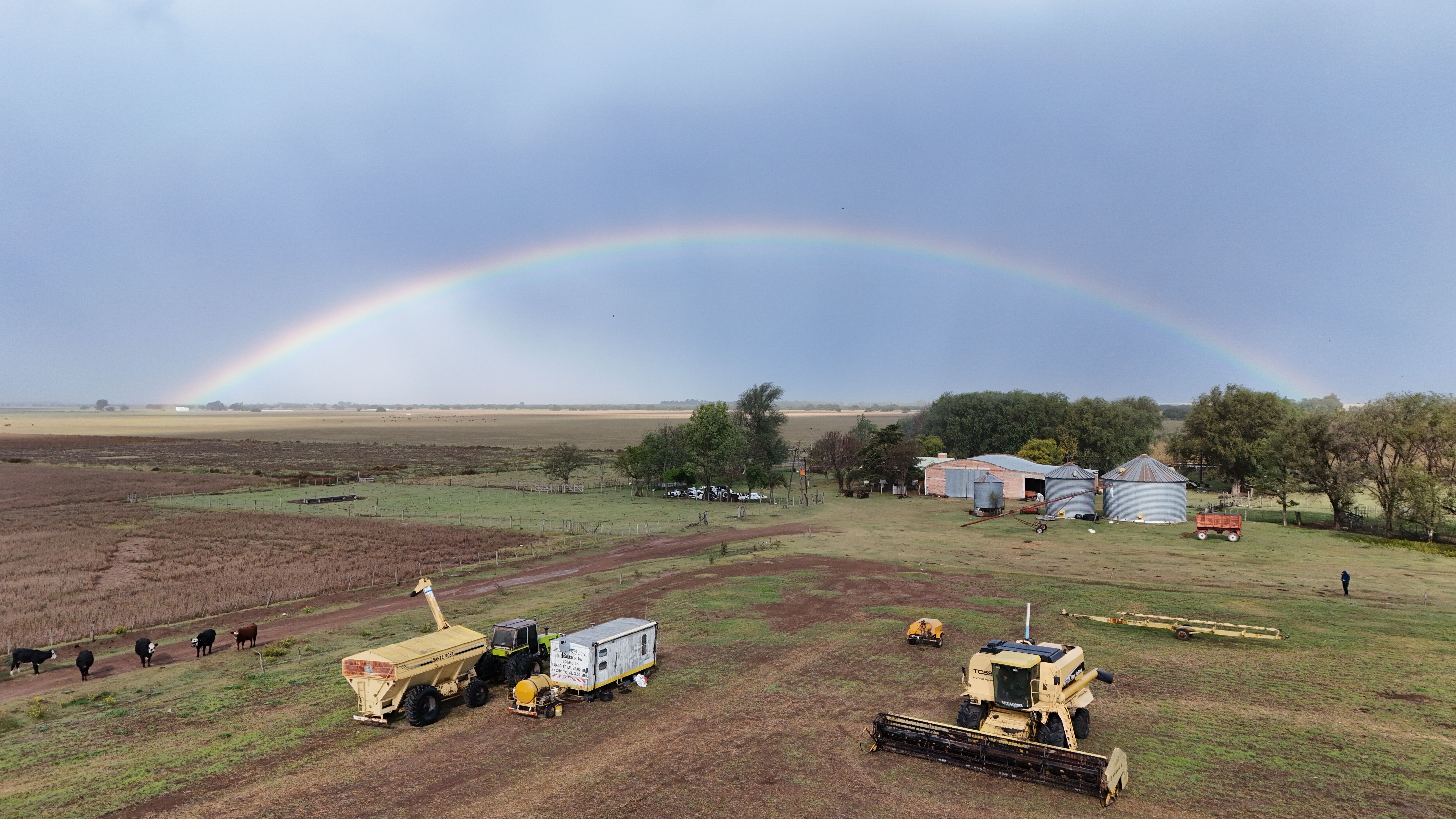 Scenic Rainbow Over Rural Farm Landscape in Argentina · Free Stock Photo