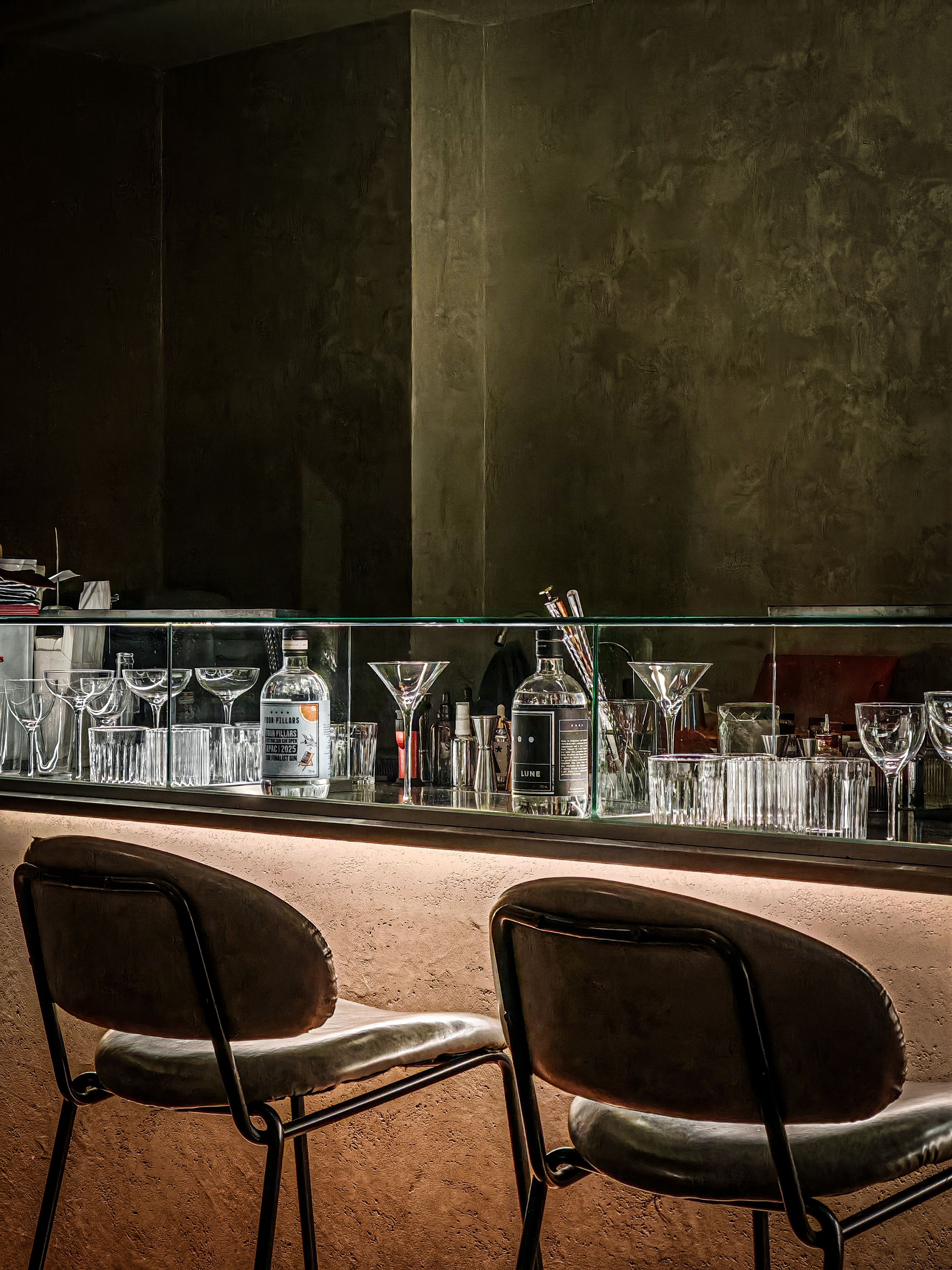 Chic Bar Interior with Glassware and Spirits · Free Stock Photo