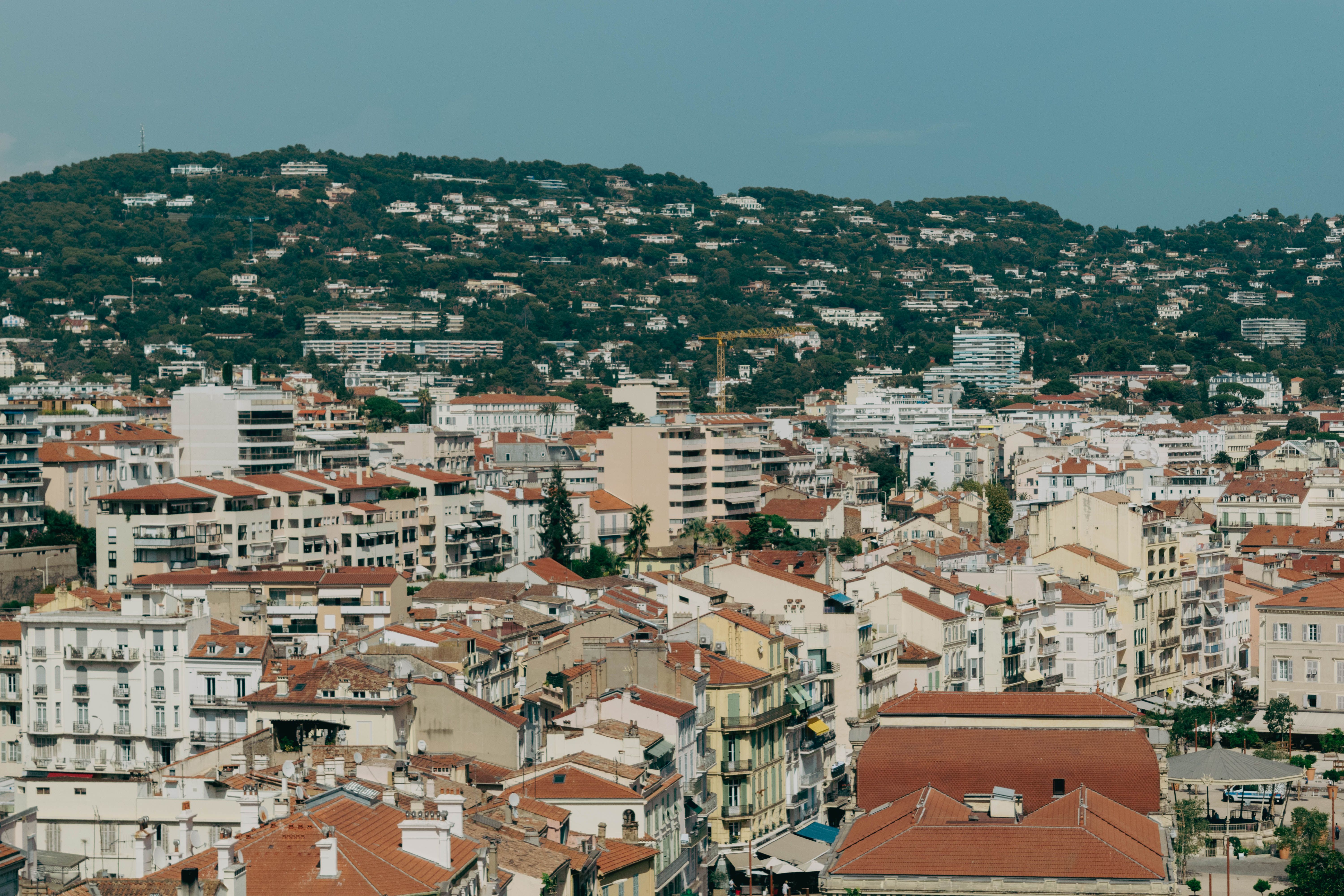 Aerial View of Cannes with Rooftops and Hills · Free Stock Photo