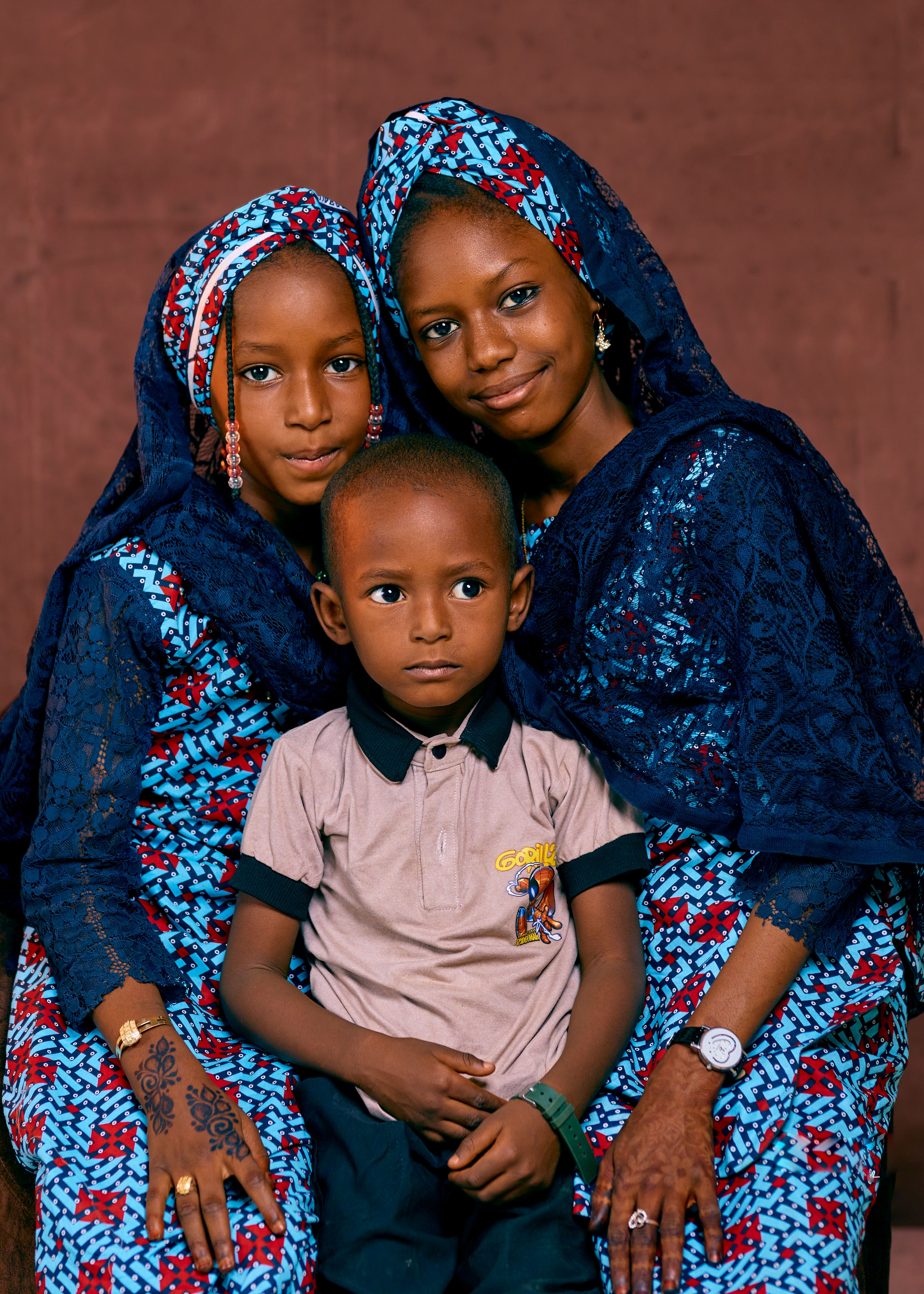 Portrait of a Family in Traditional Attire · Free Stock Photo