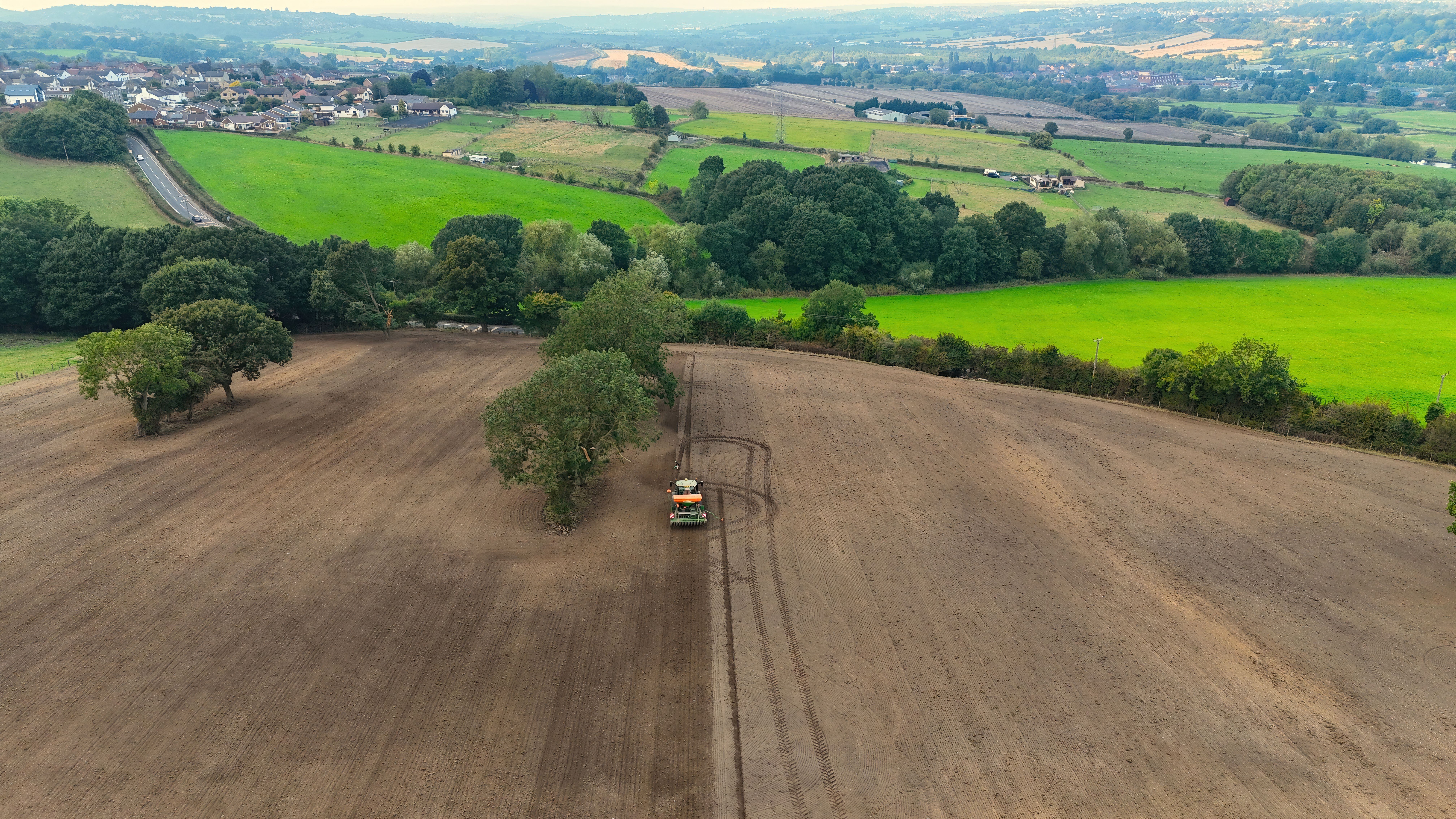 Aerial View of Farming Tractor in Yorkshire Fields · Free Stock Photo