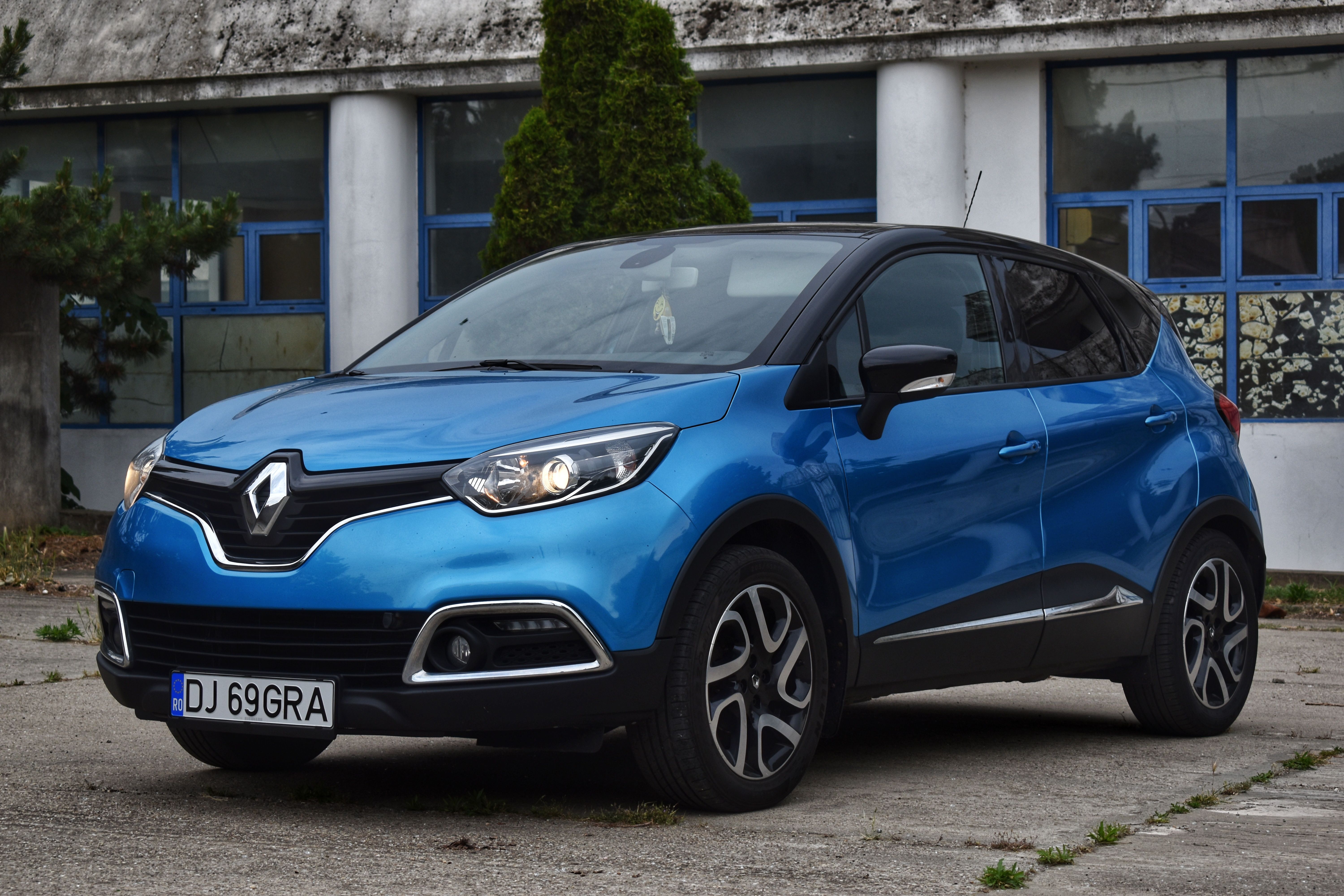 Blue Renault Car Parked Outdoors · Free Stock Photo