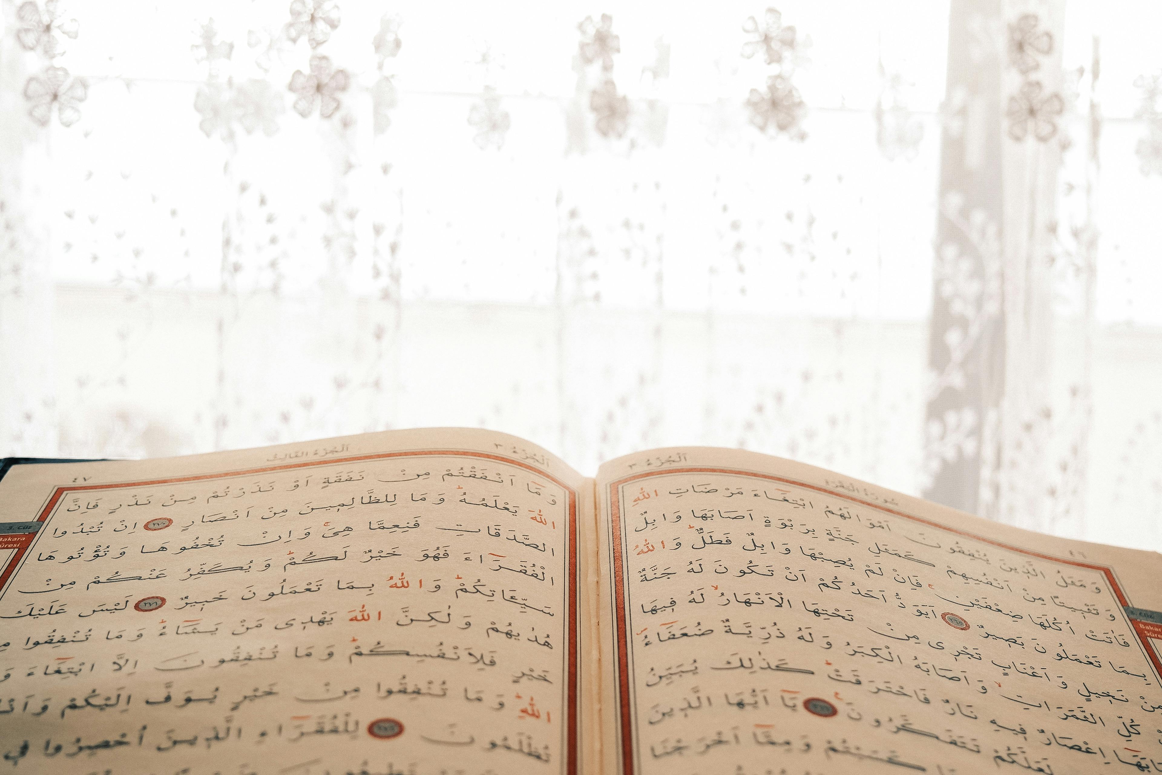 Open Arabic Book with Decorative Curtain Background · Free Stock Photo