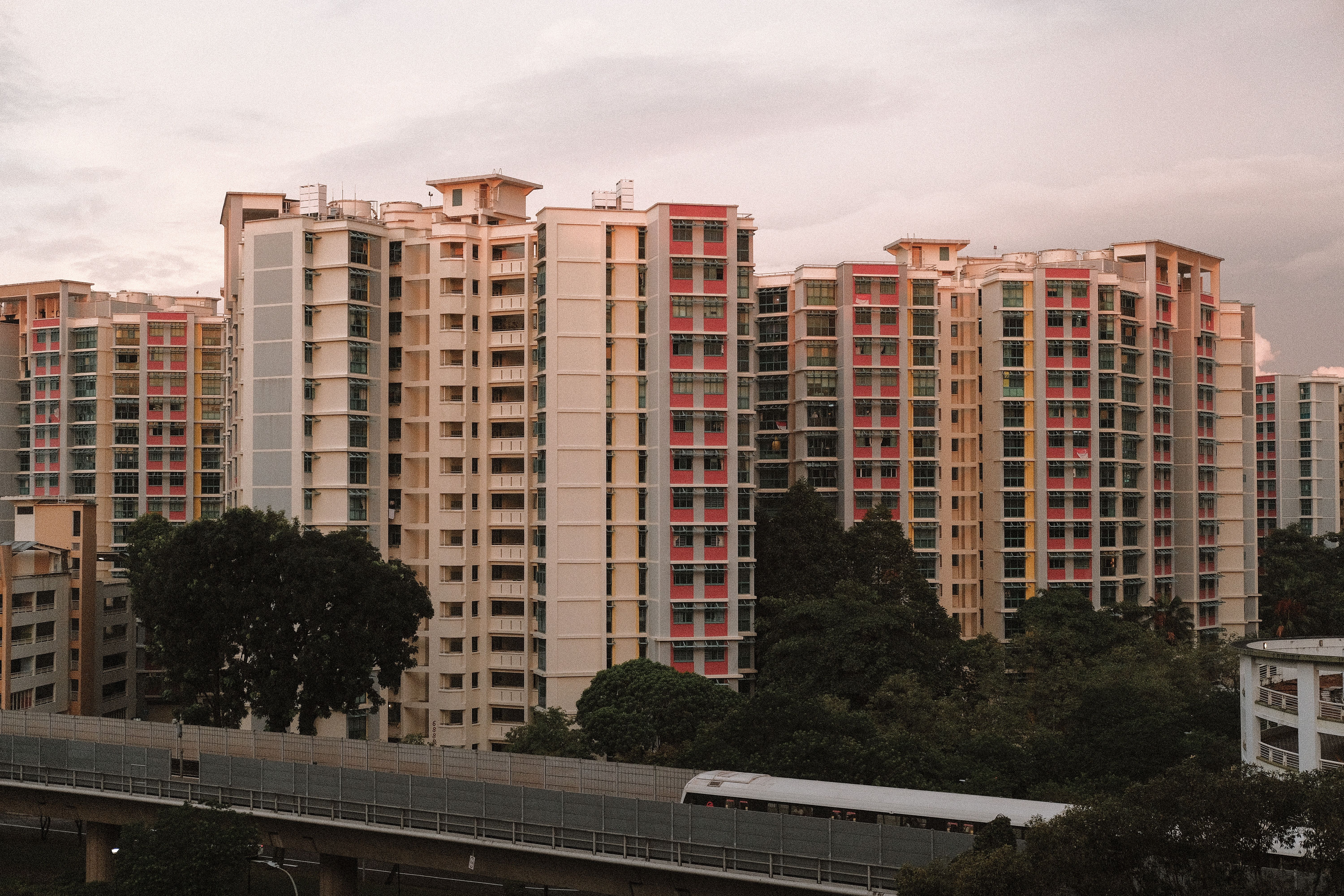 Sunset Cityscape of High-Rise Apartments · Free Stock Photo