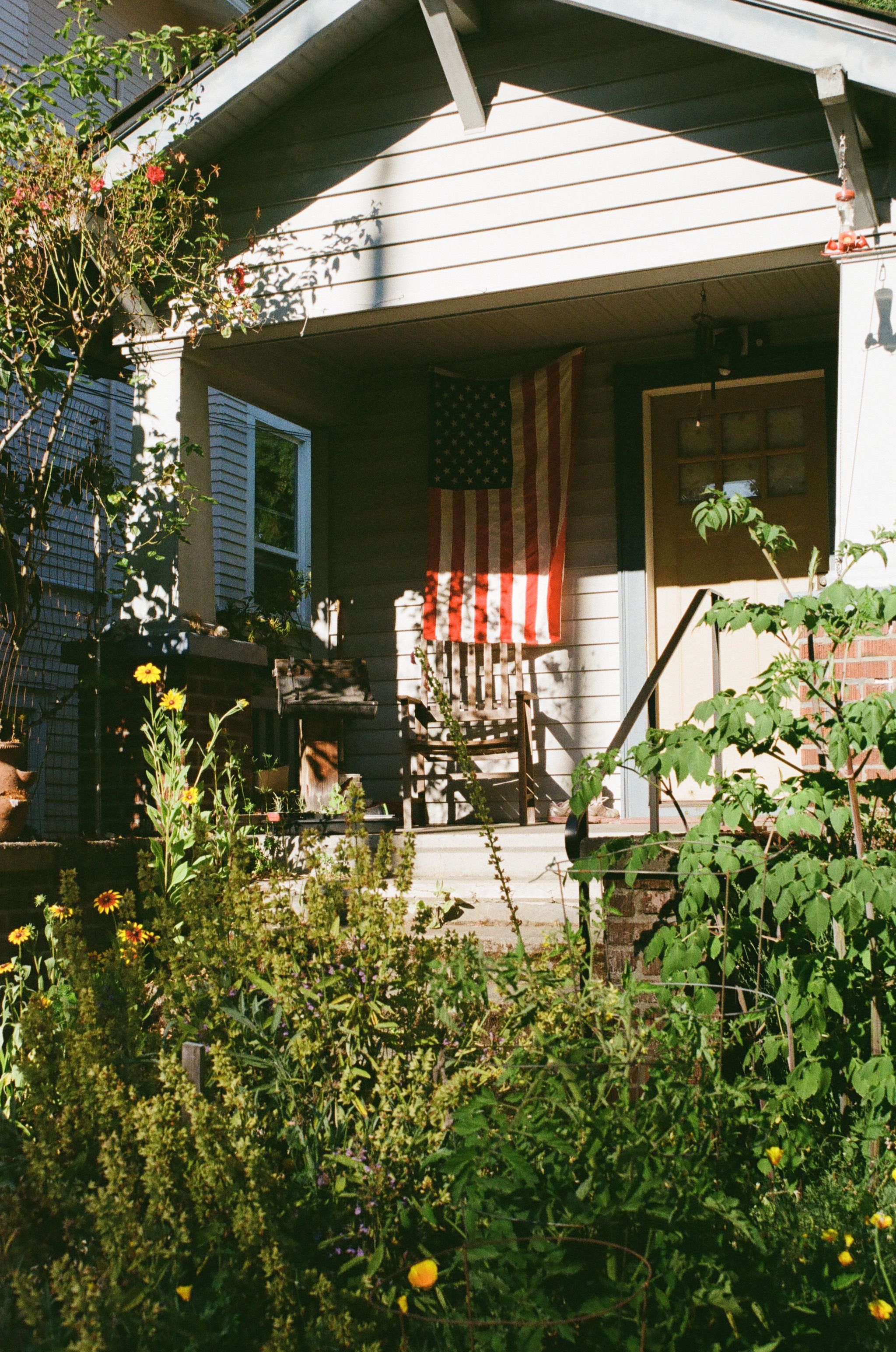 Cozy American Front Porch with Garden View · Free Stock Photo