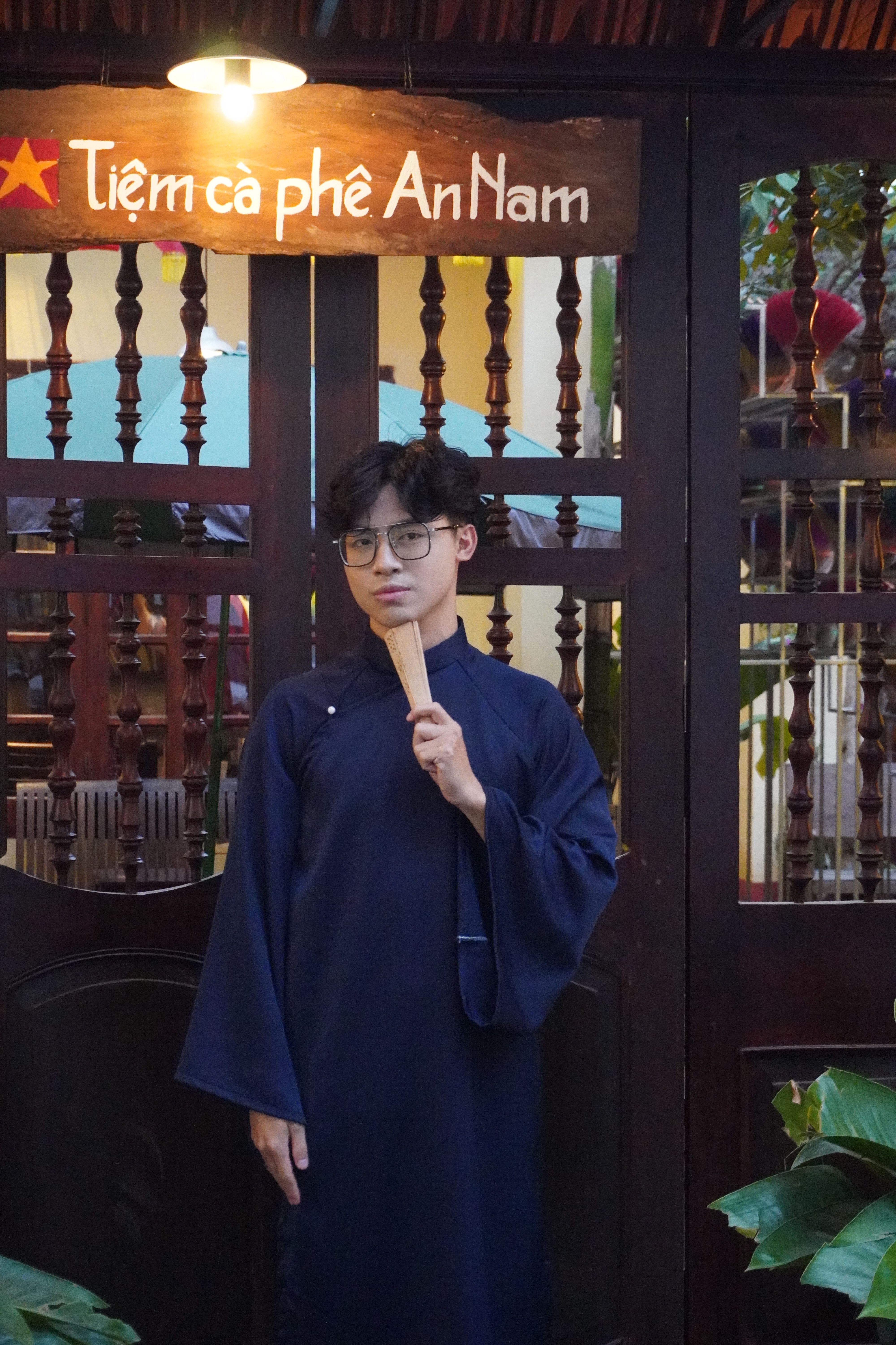 Young Man in Traditional Vietnamese Attire · Free Stock Photo