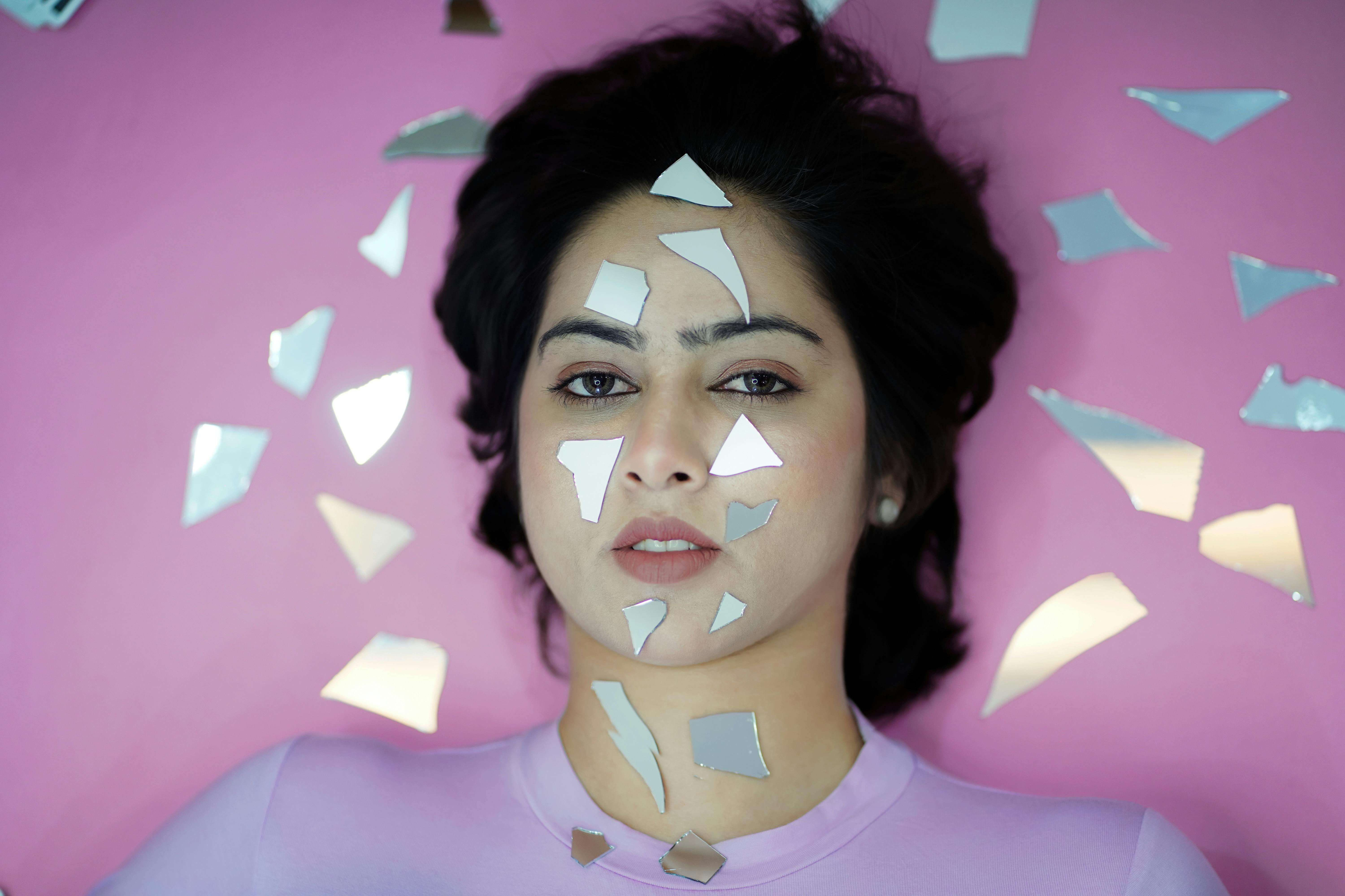 Creative Portrait with Mirror Reflections on Pink · Free Stock Photo