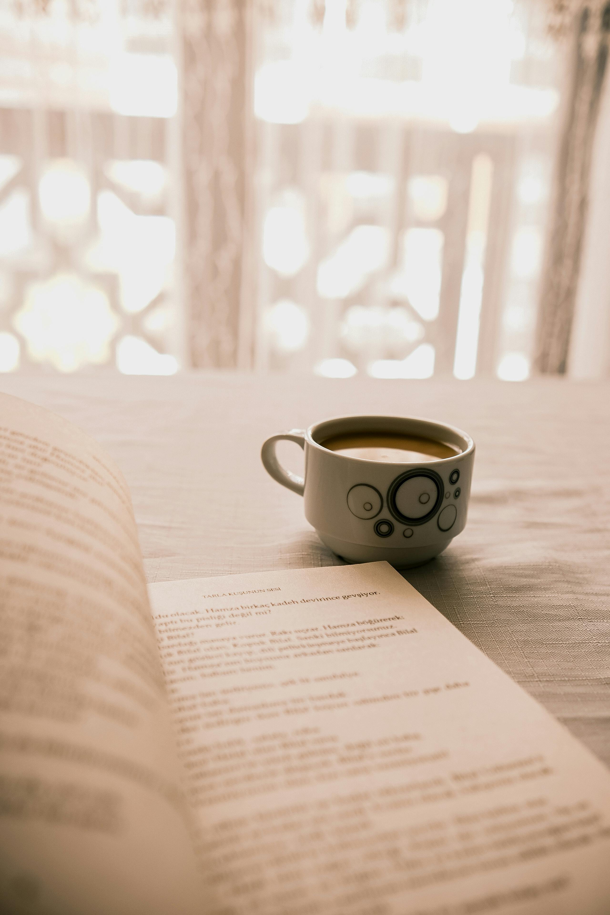 Cozy Morning Reading with Coffee Mug · Free Stock Photo