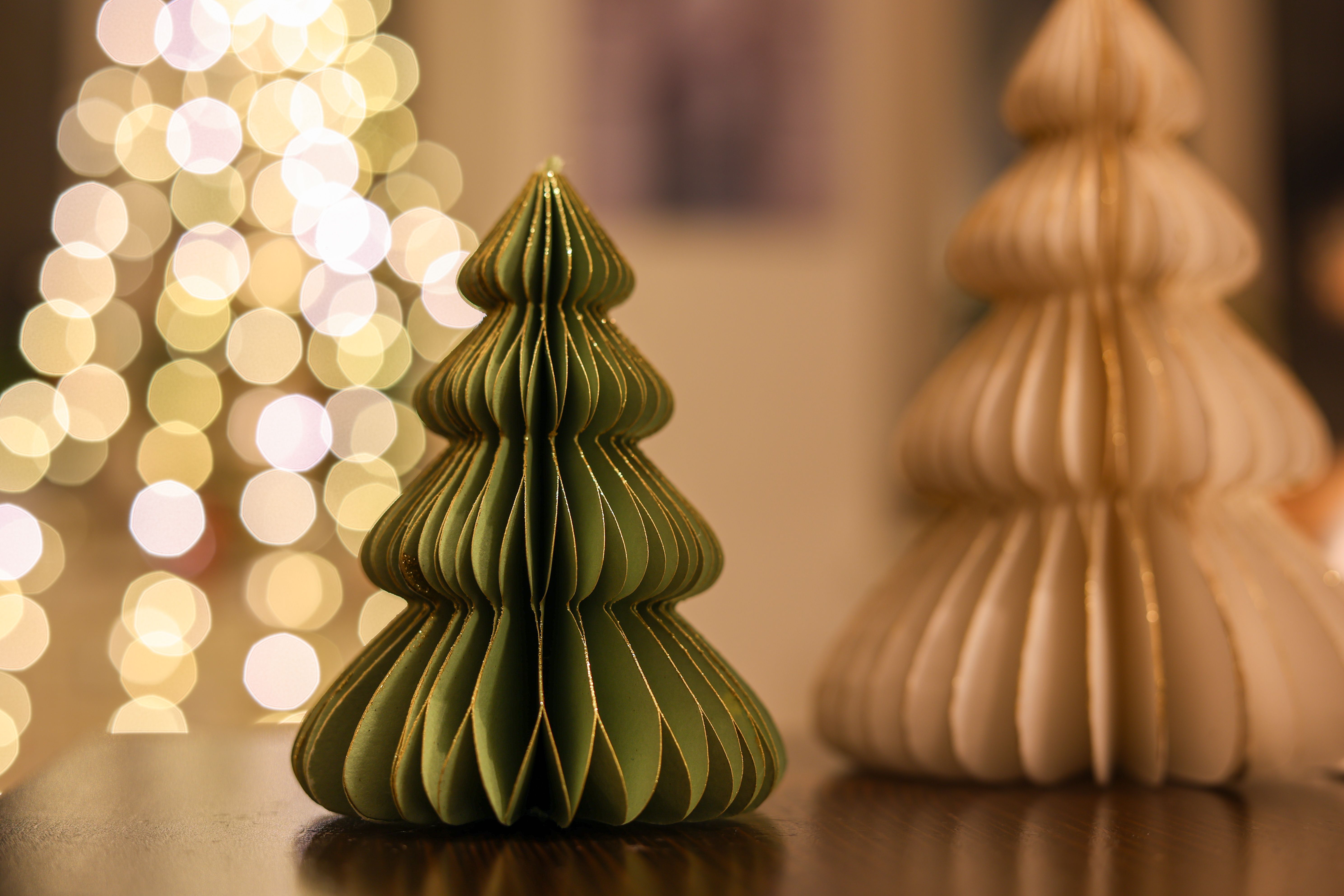 Festive Paper Christmas Tree Decorations with Bokeh · Free Stock Photo