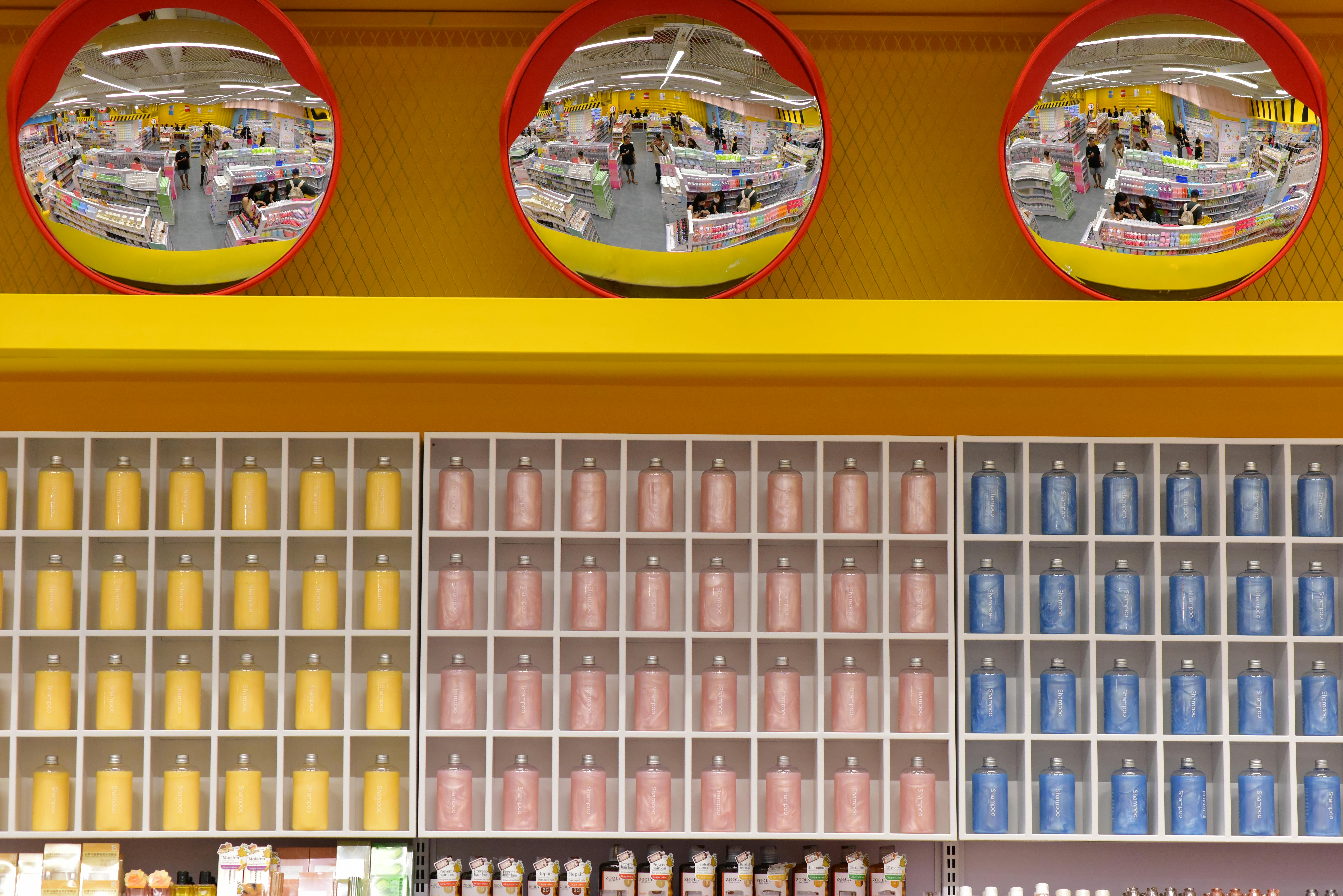 Bright Warehouse Interior with Colorful Shelving · Free Stock Photo