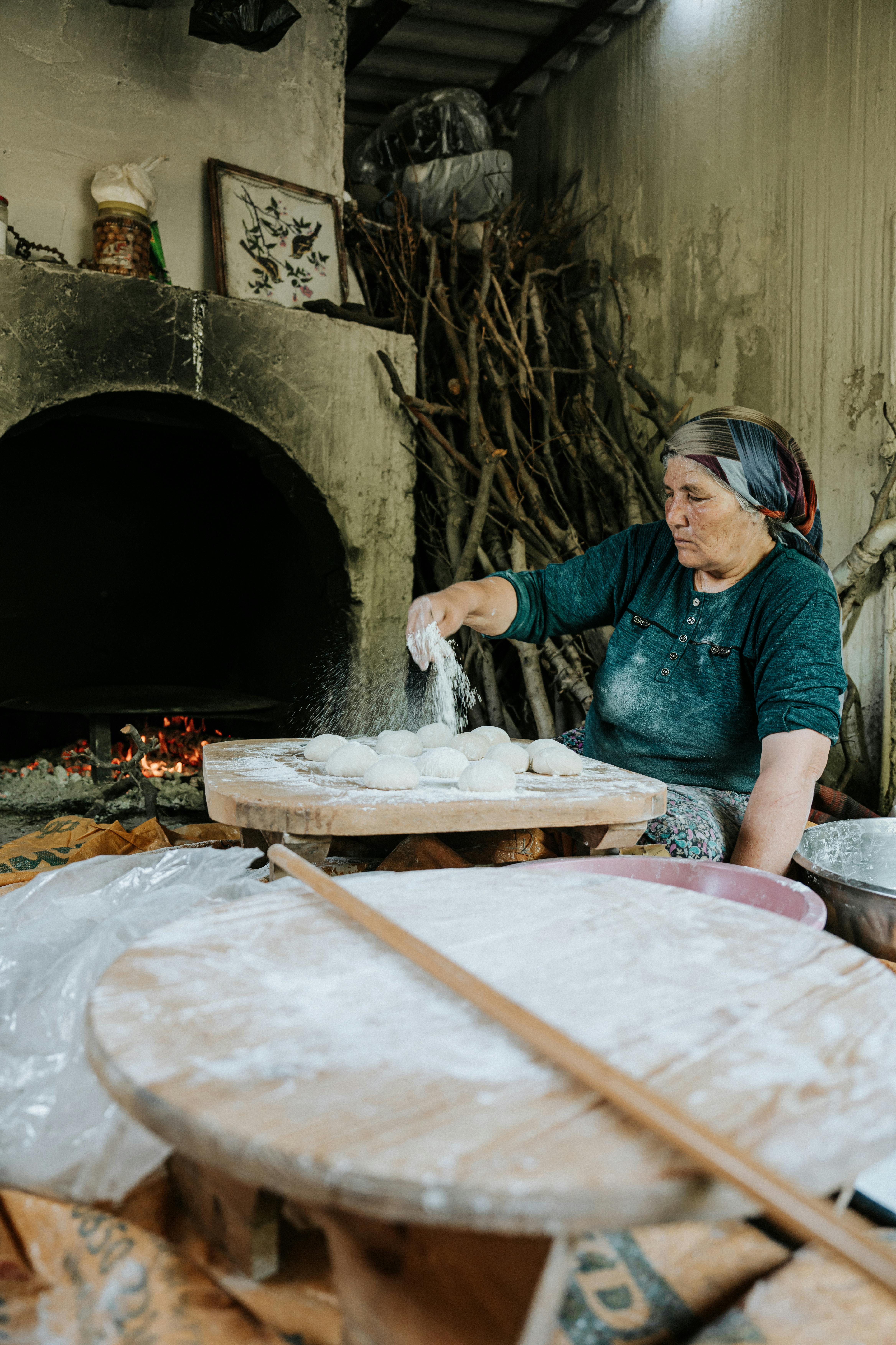 Traditional Bread Making in Rustic Kitchen Setting · Free Stock Photo