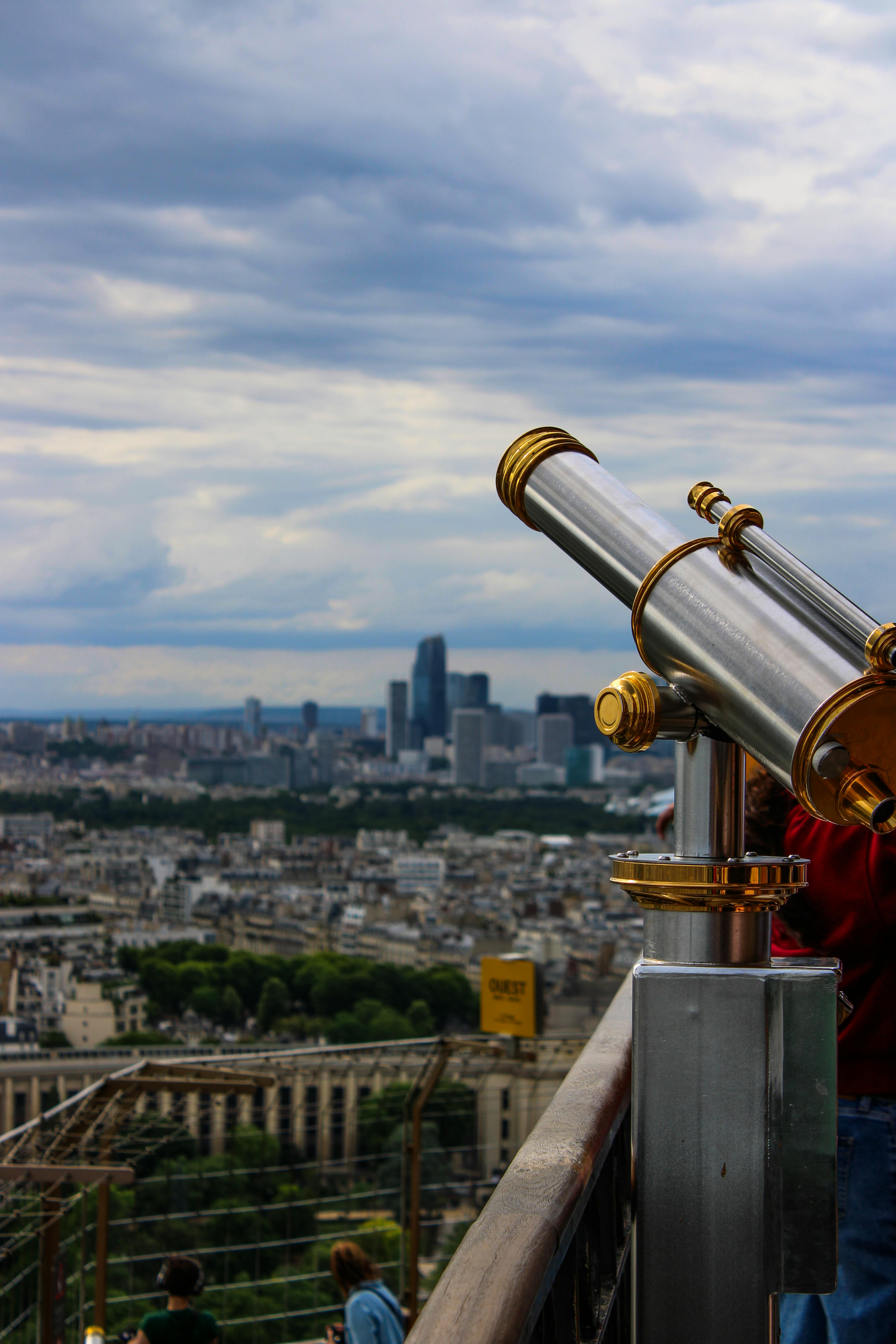 Gray and Brown Tower Telescope Near Trees and High Rise Buildings ...
