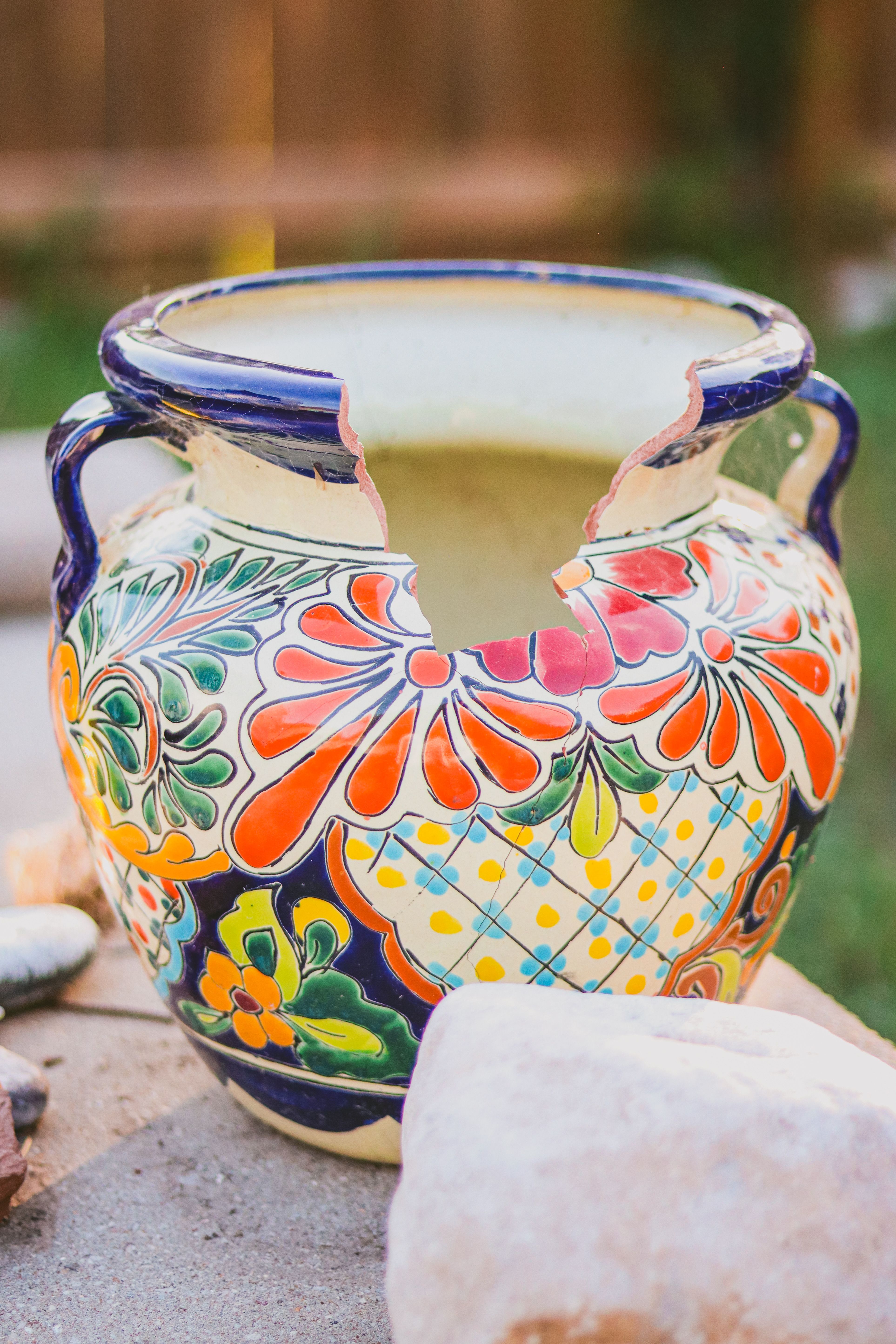 Colorful Broken Ceramic Pot in Outdoor Setting · Free Stock Photo