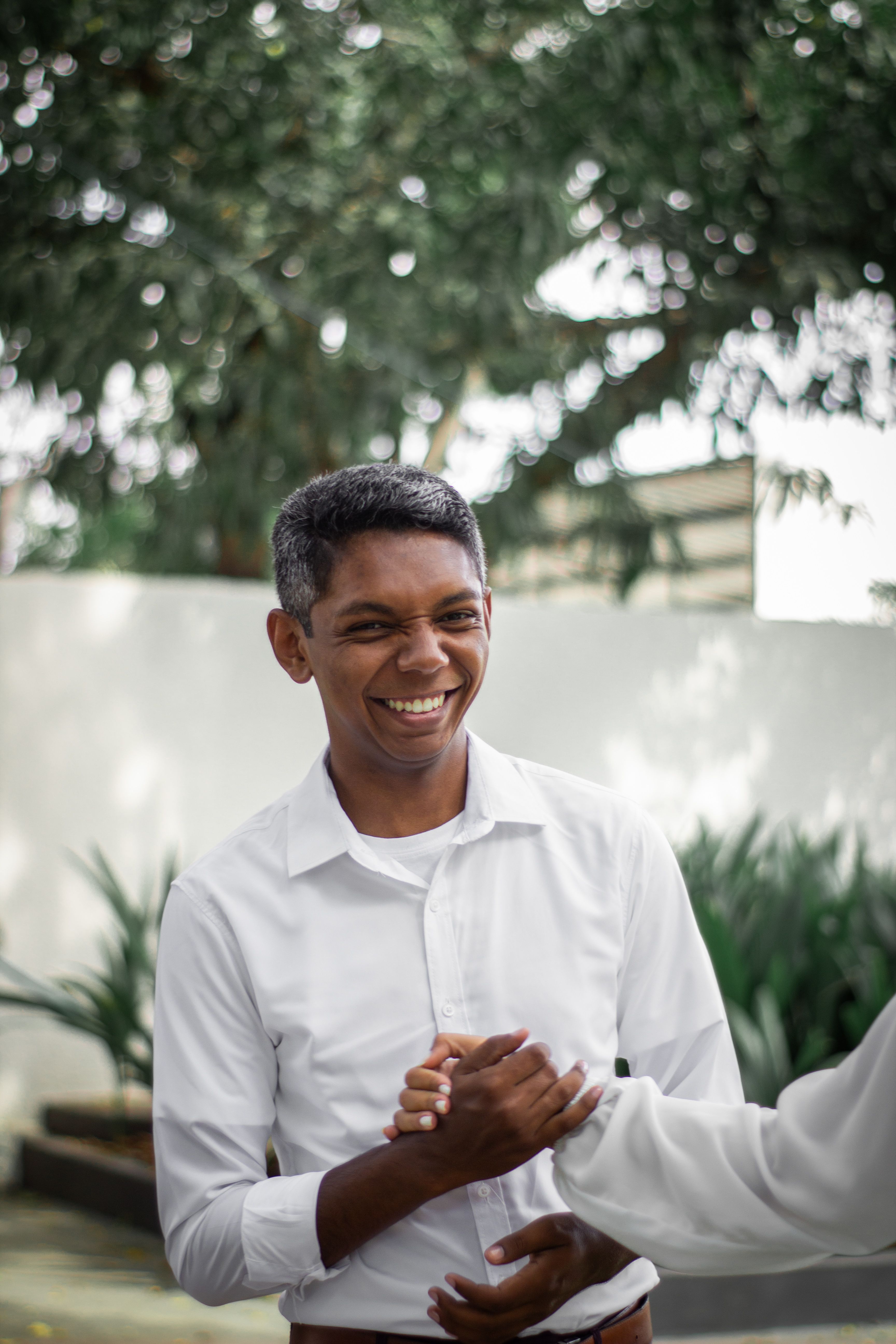 Young Professional Greeting with Handshake Outdoors · Free Stock Photo
