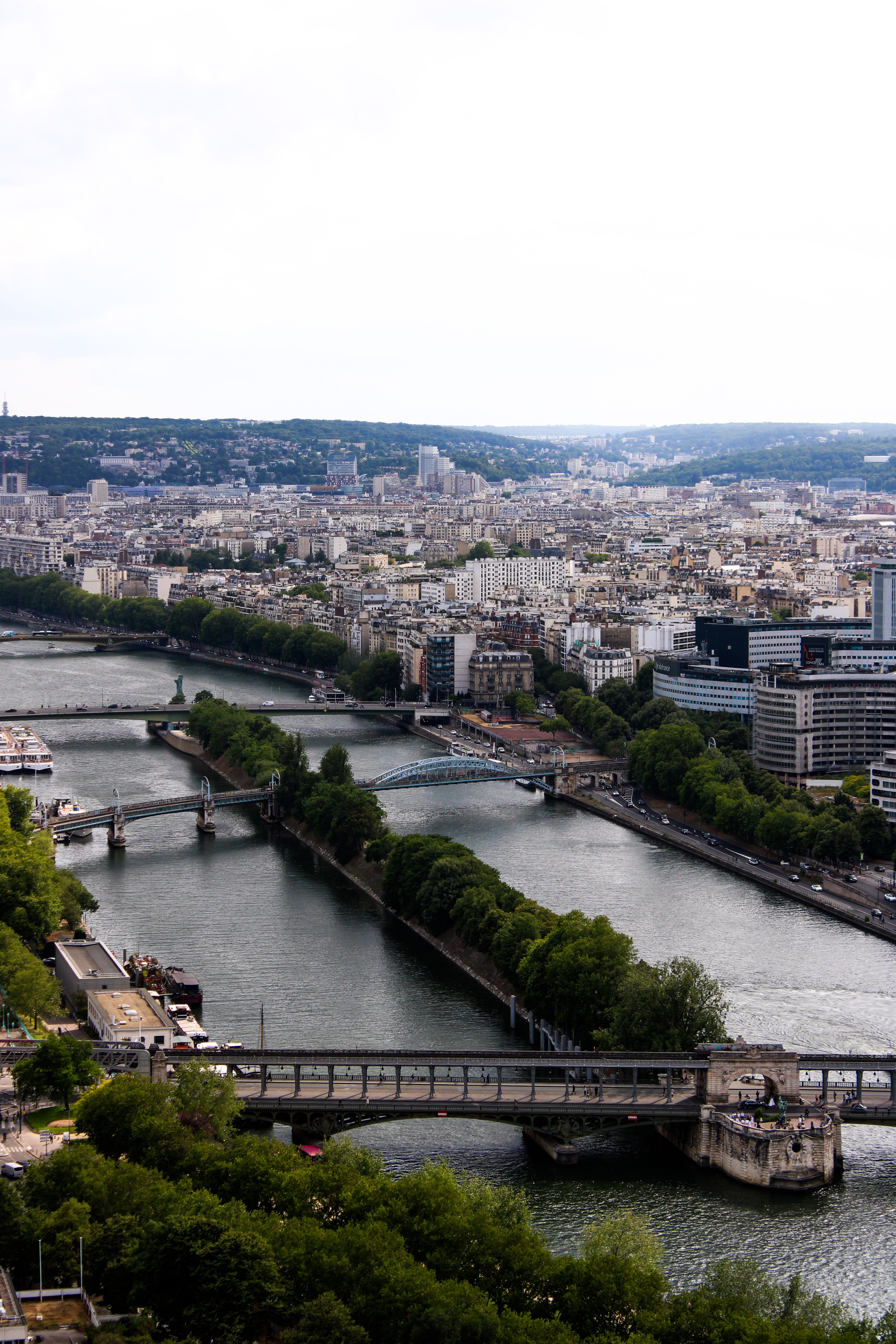 Aerial View of Paris with Iconic River Seine · Free Stock Photo